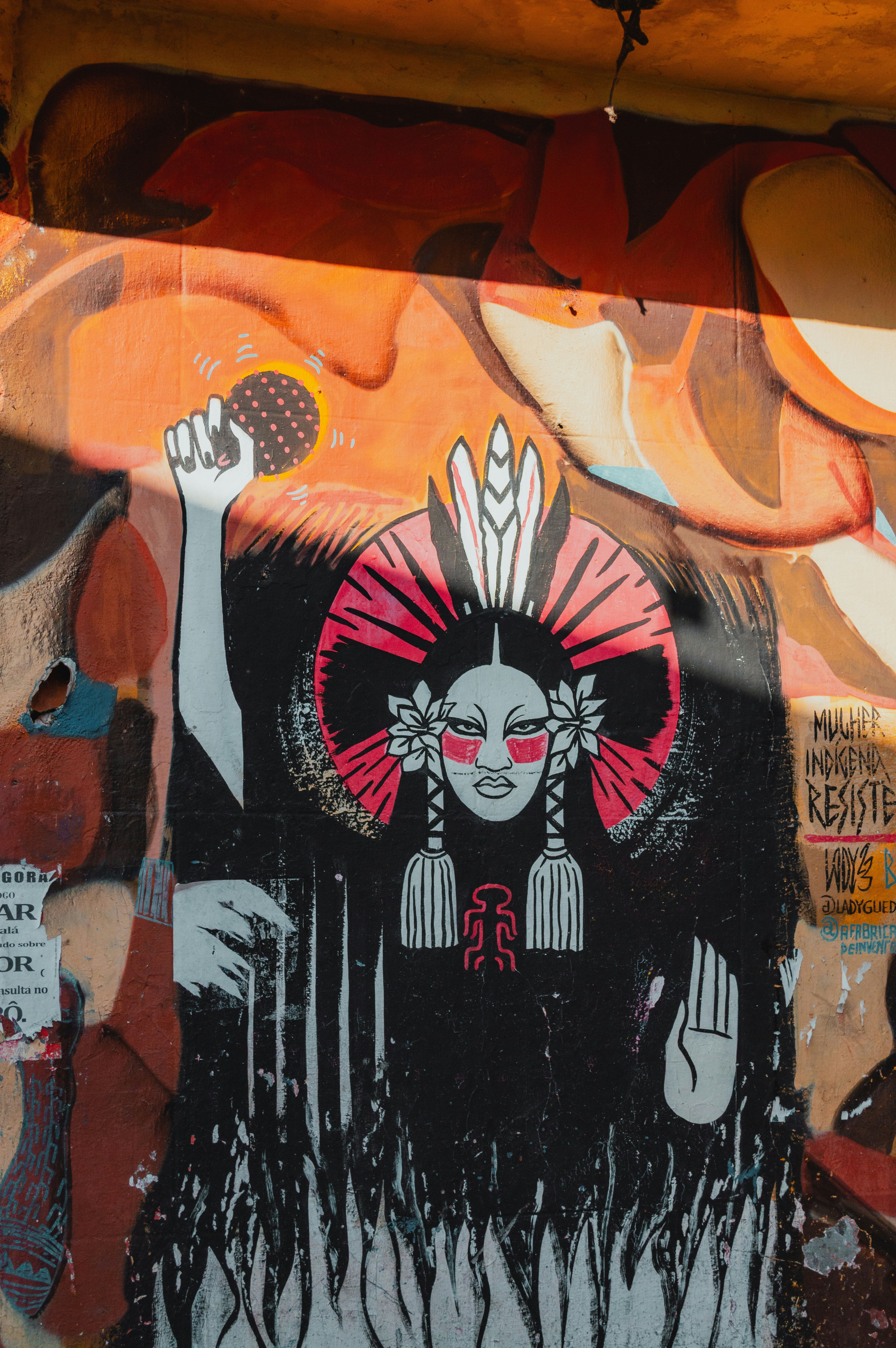 Blue Goddess of the Underground: A Graffiti Portrait Emerges from Warm Hues