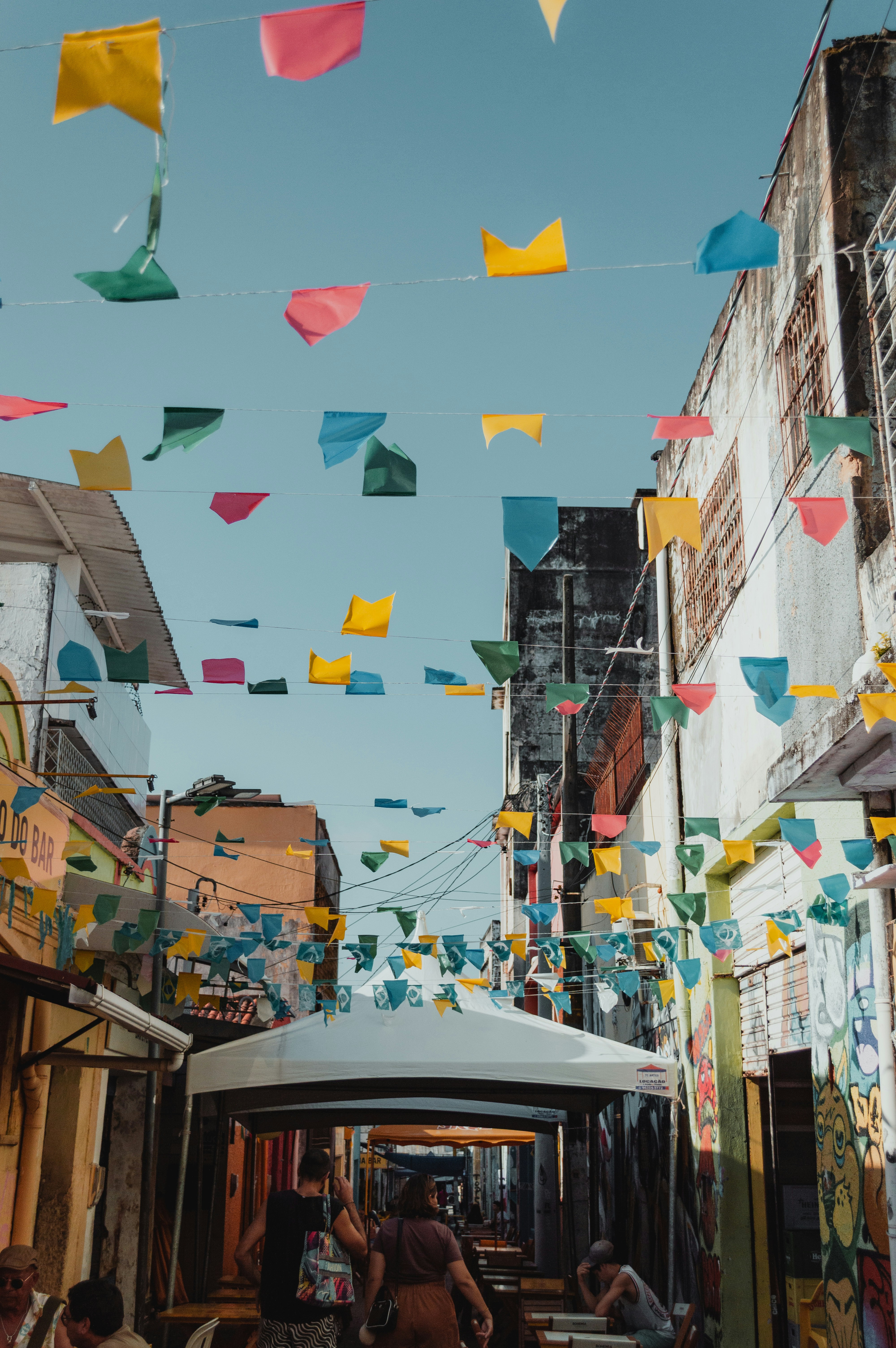 Colorful street festival under a sky of fluttering pennants