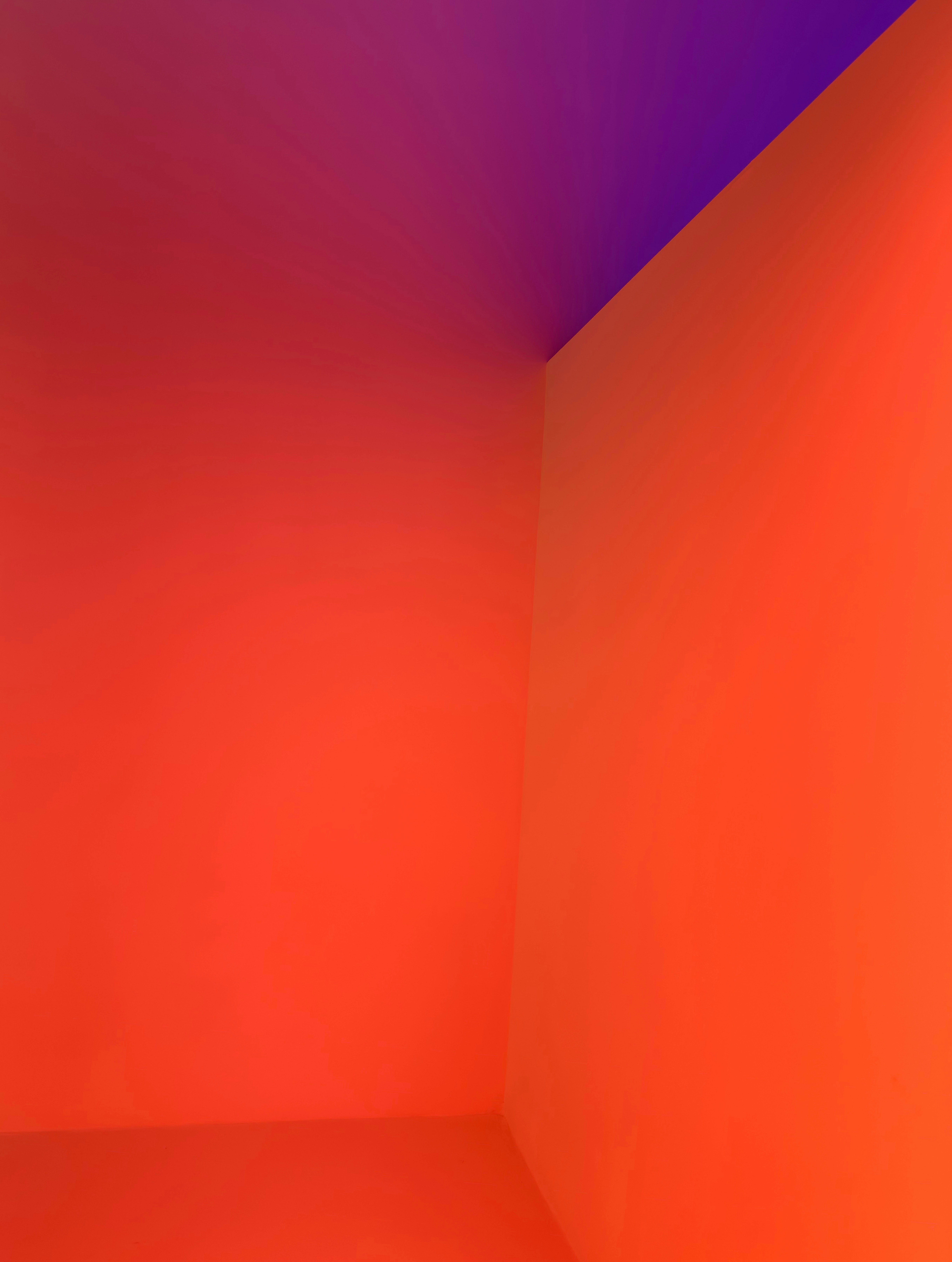 Gradient Corner: A Vivid Orange Room with Purple Accents