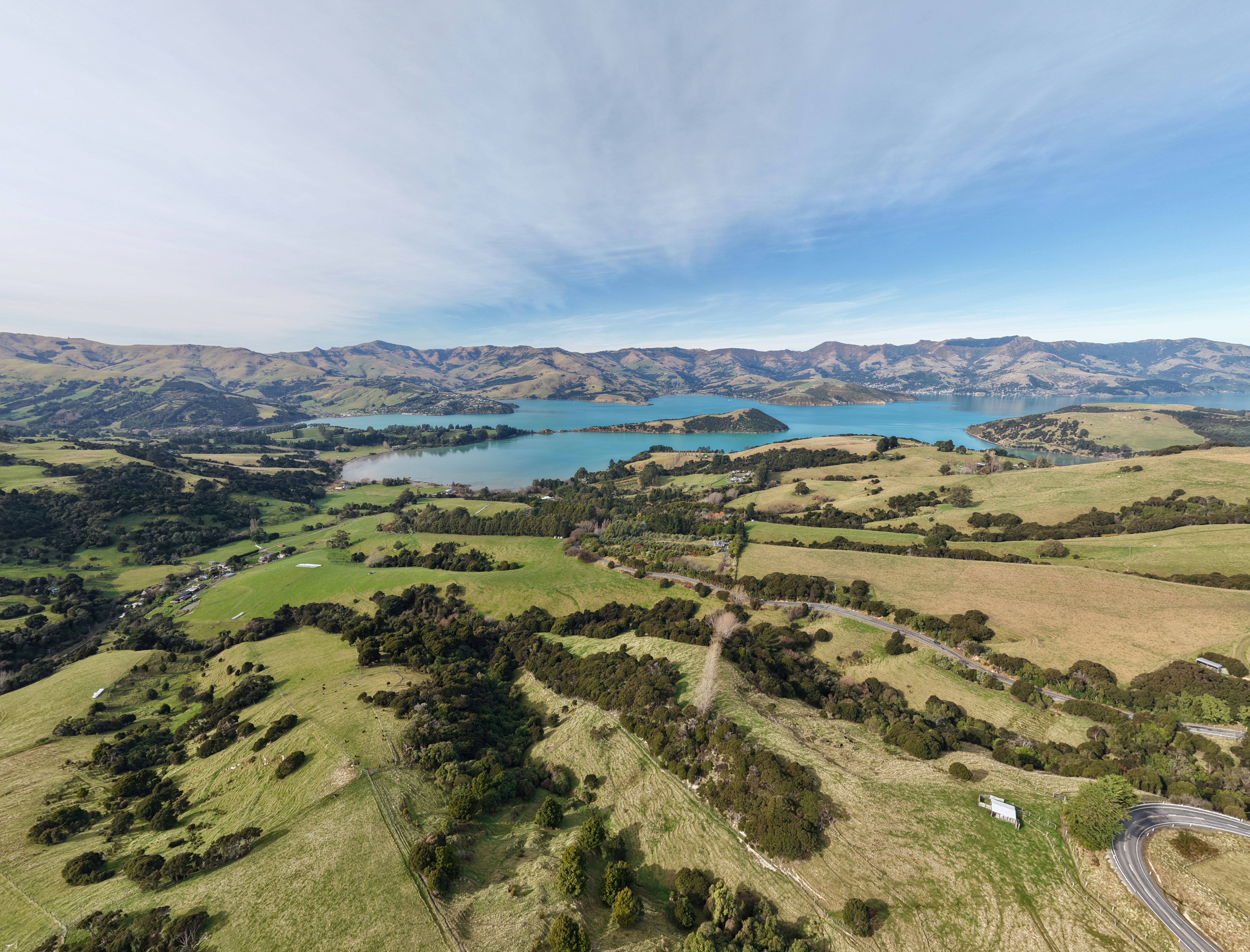 Aerial Vista: Lake, Hills, and Verdant Patchwork
