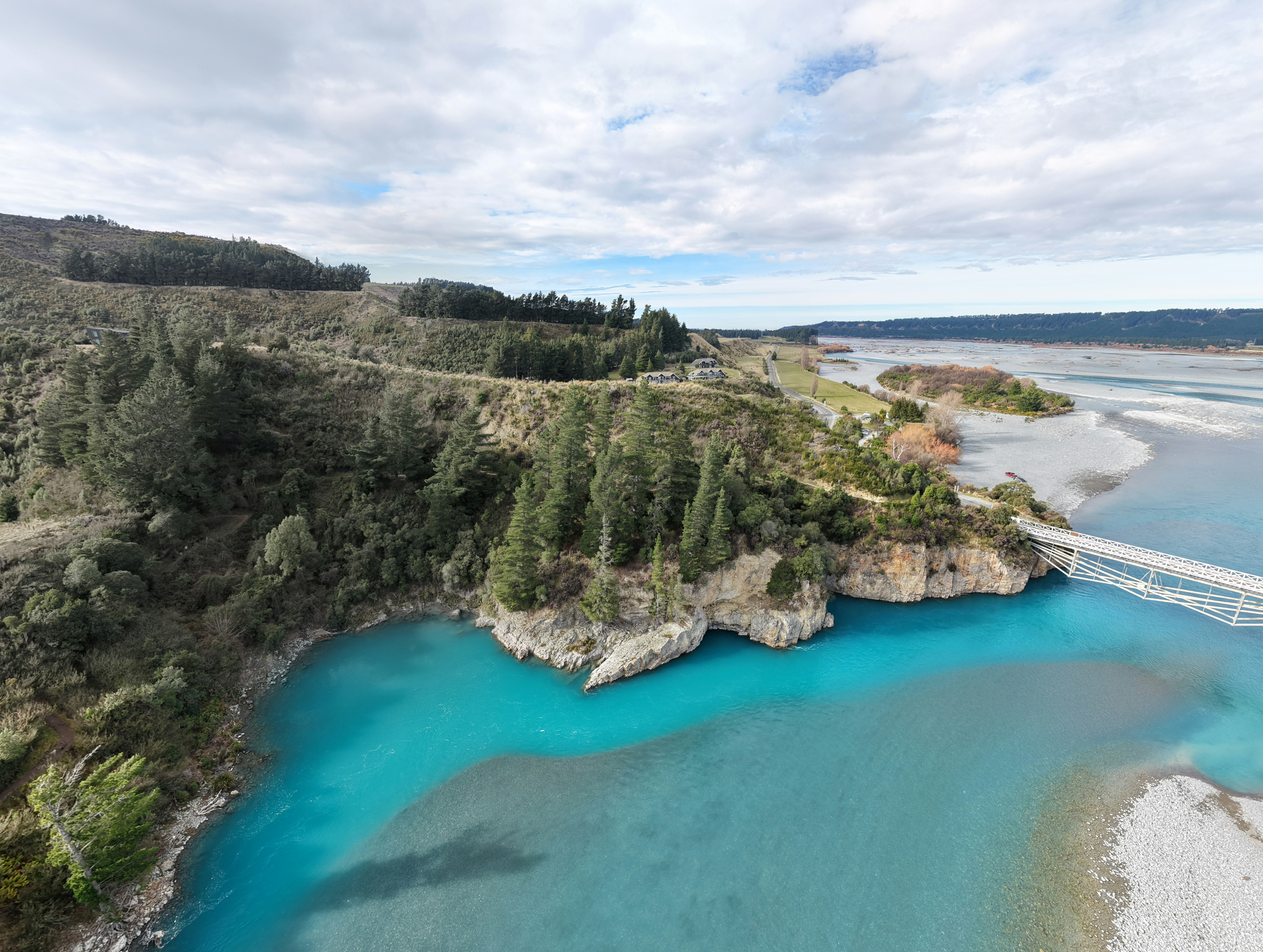 Turquoise Estuary Bridge: Aerial Echoes Over a Coastal Hammock