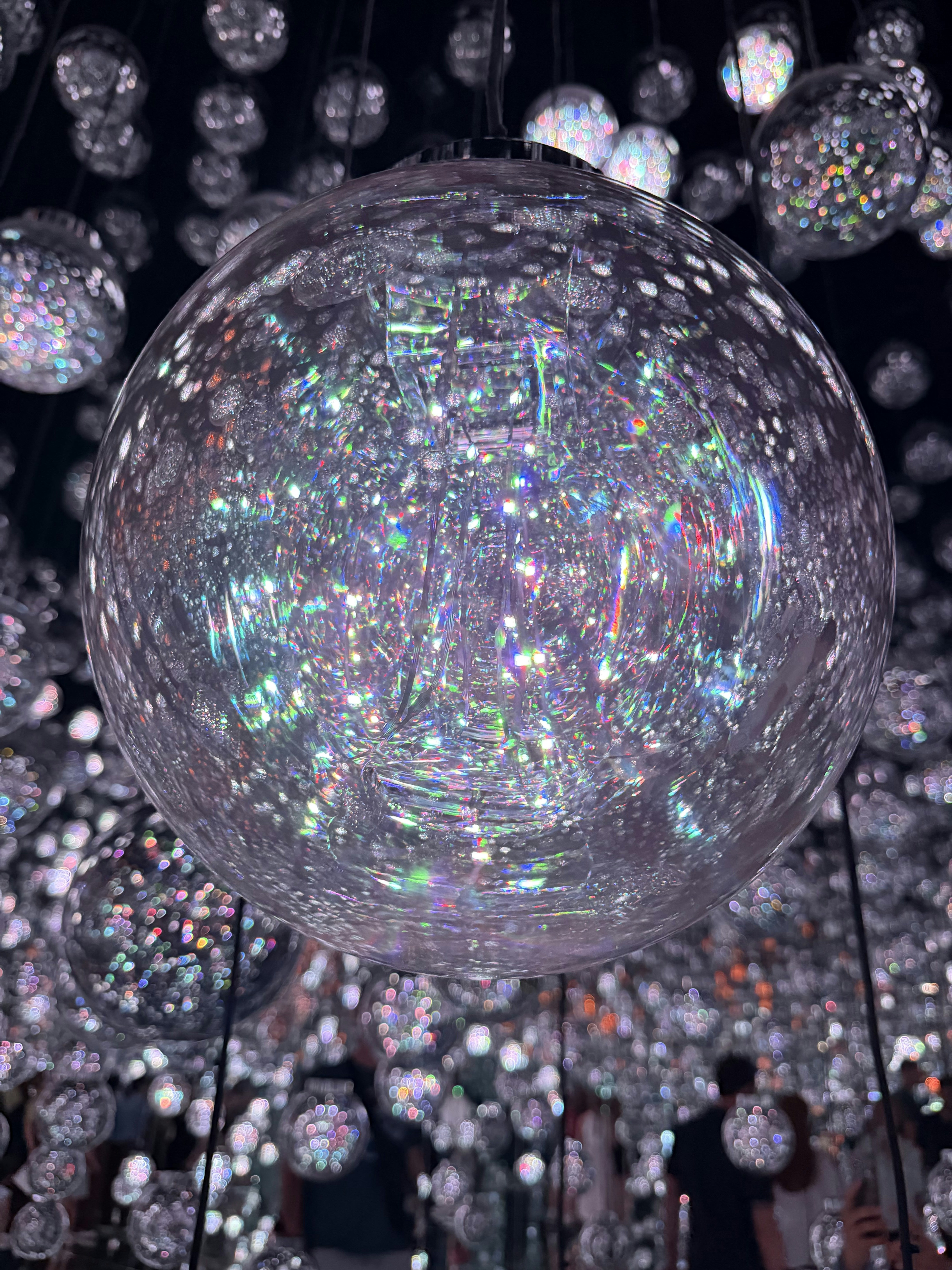 Orb of Prismed Echoes in a Hall of Lights