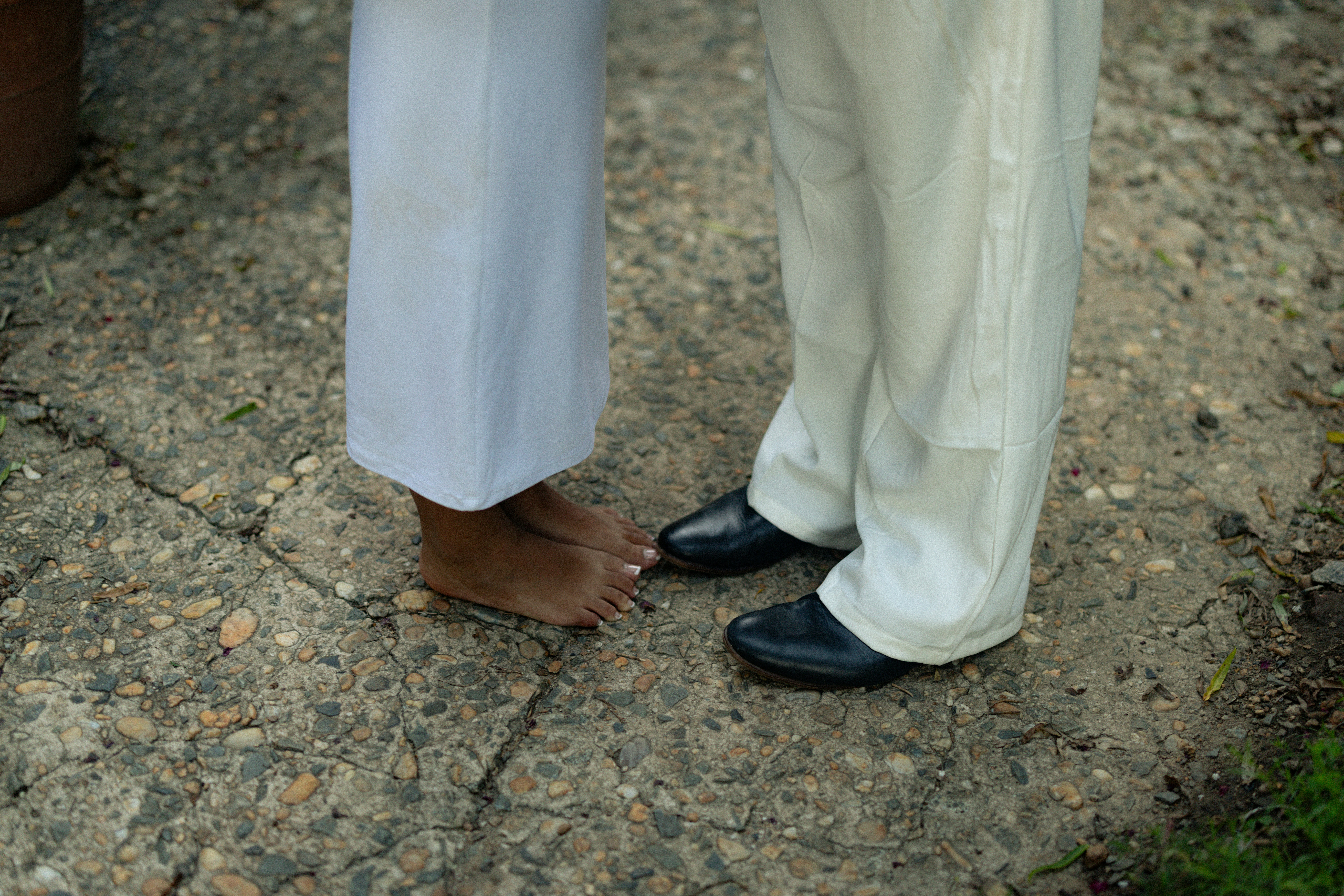 Bare Feet Meet Dress Shoes: A Quiet Exchange Grounded in Contrast