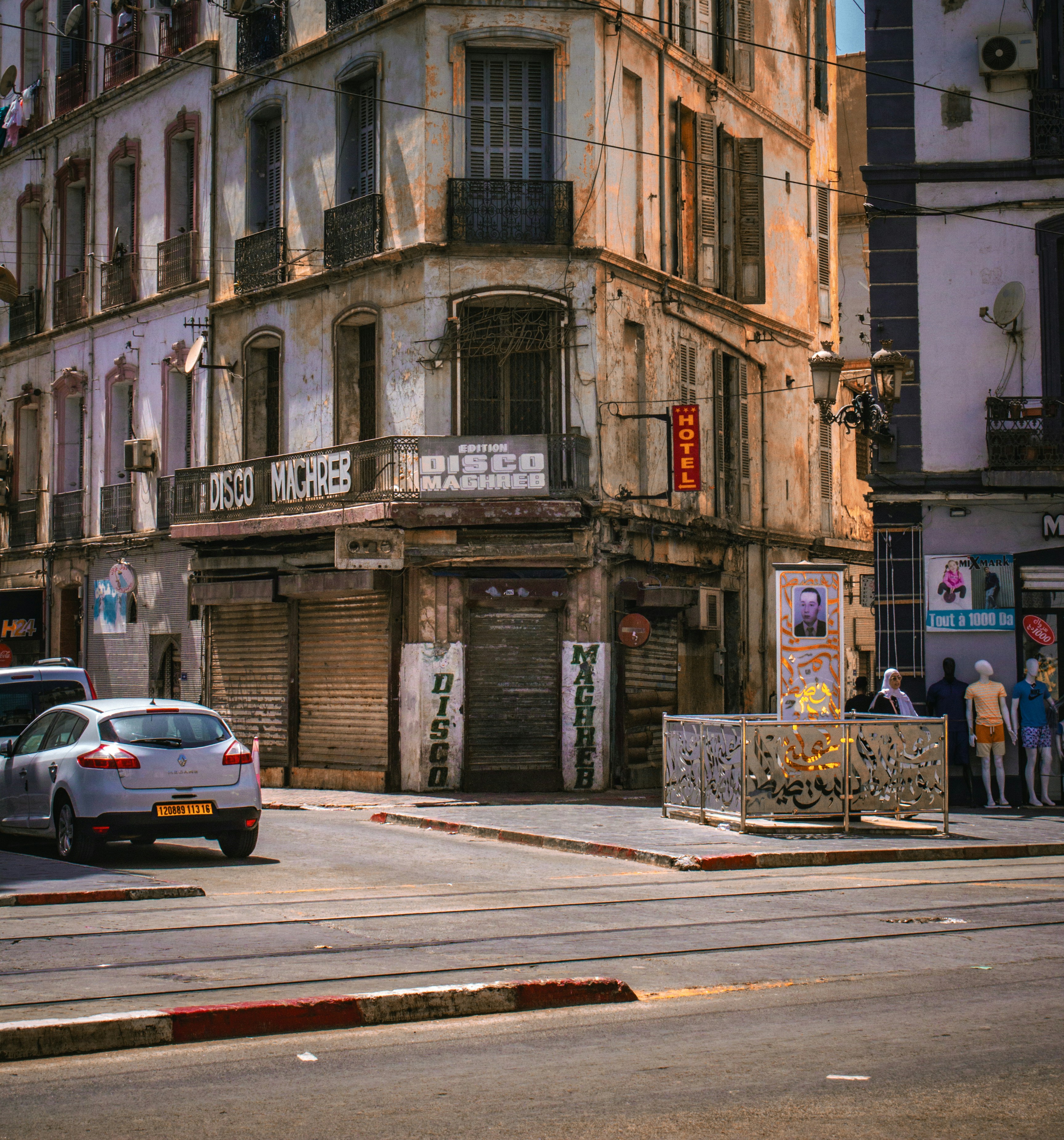Sunlit Facade and Street Corner in an Old City Block