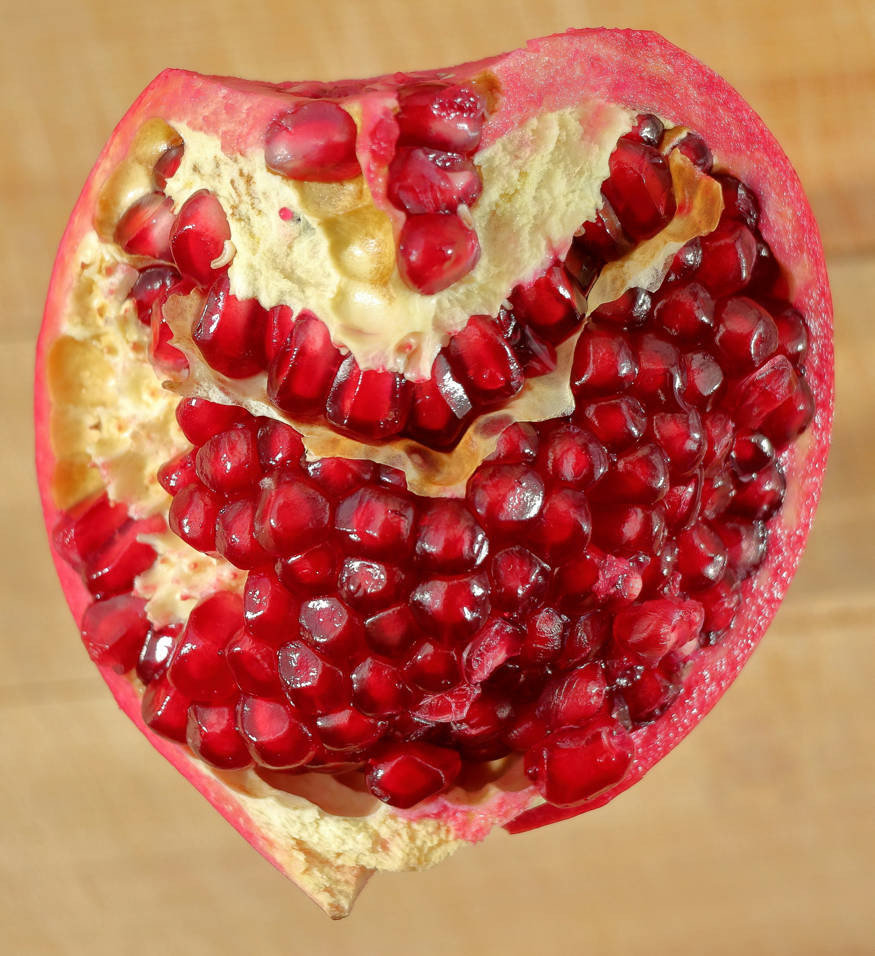 Crimson Seams: Inside a Pomegranate Crown