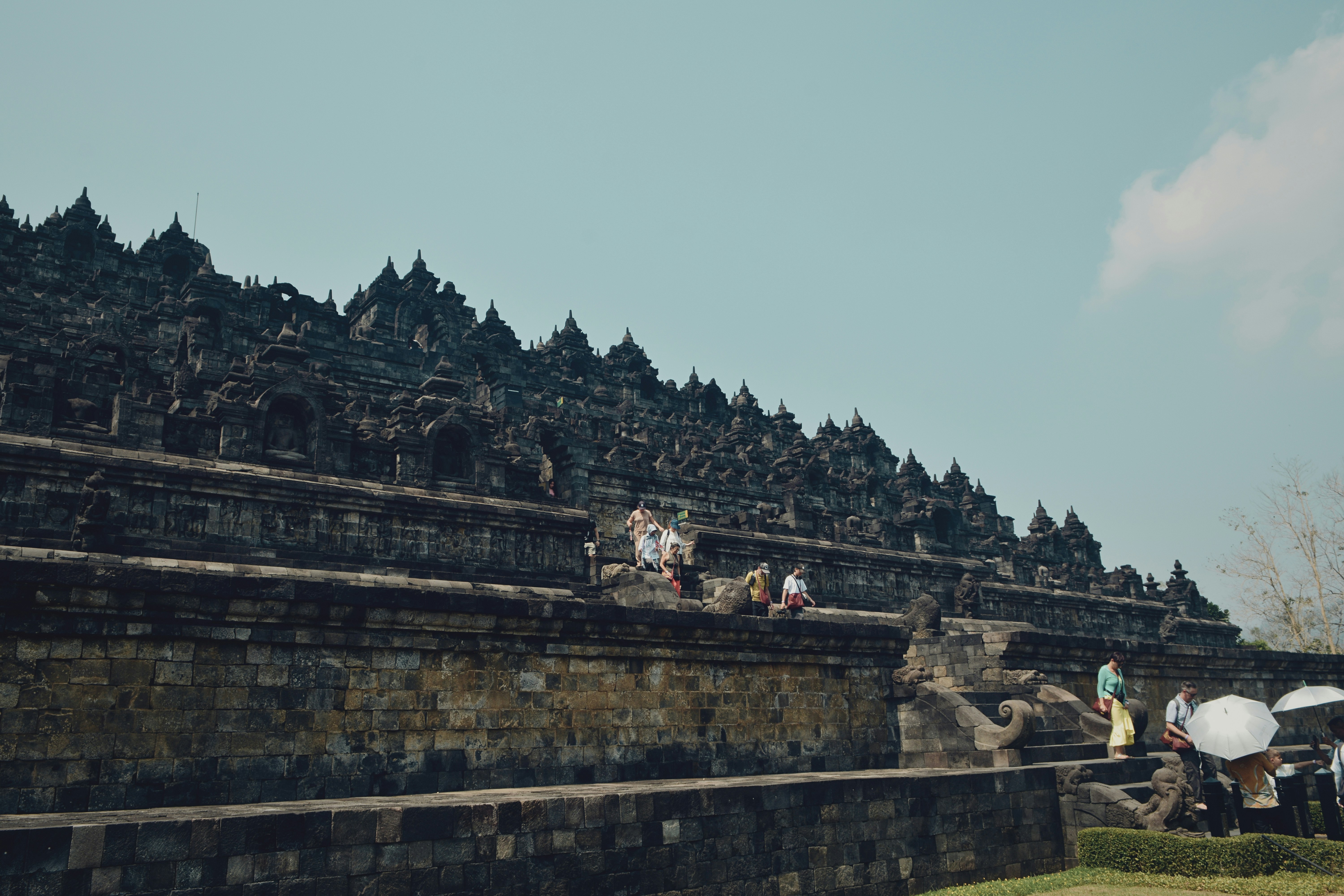Stone Temple Walkway under a Clear Sky