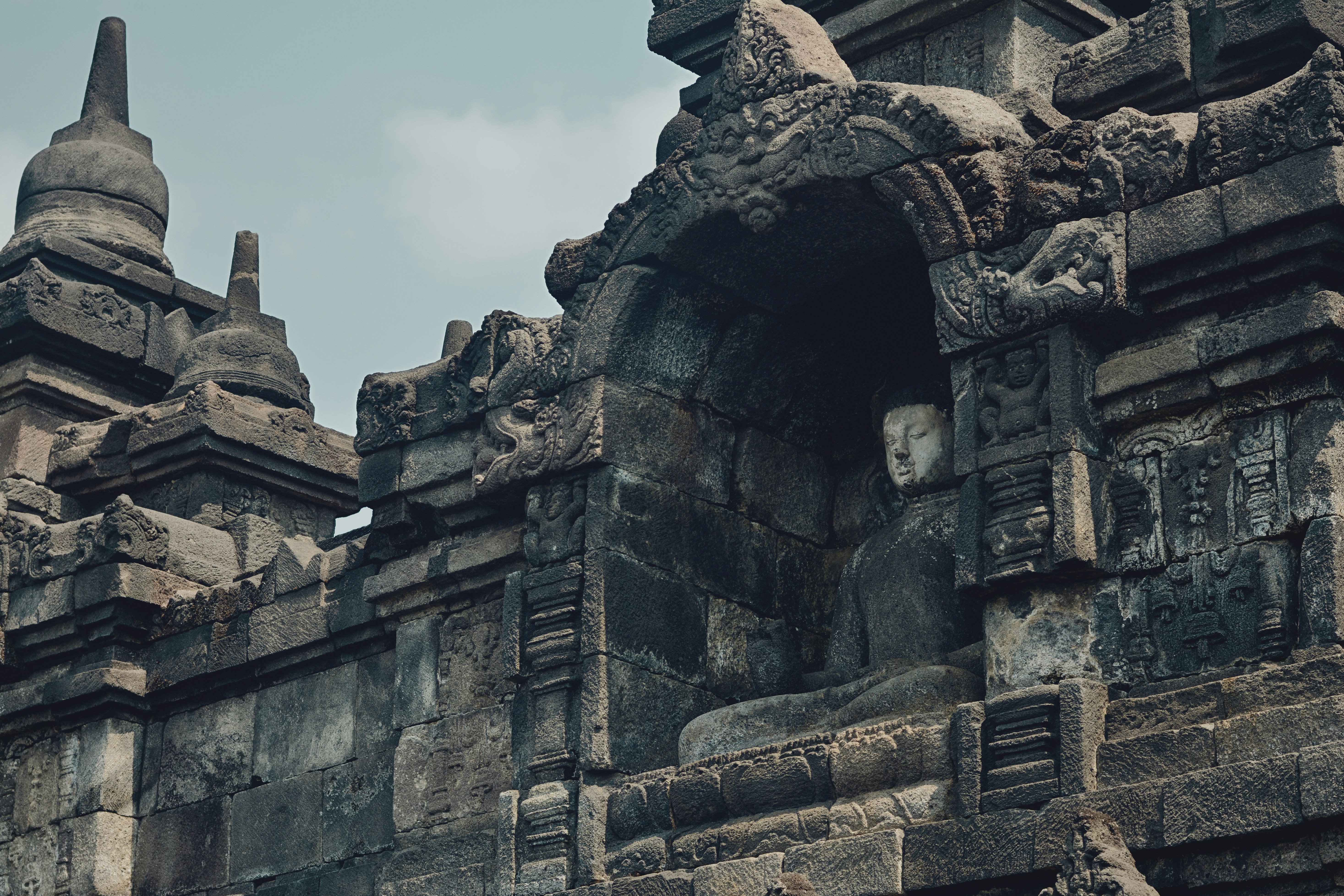 Stone Carved Sentinel: A Quiet Face in the Temple Wall