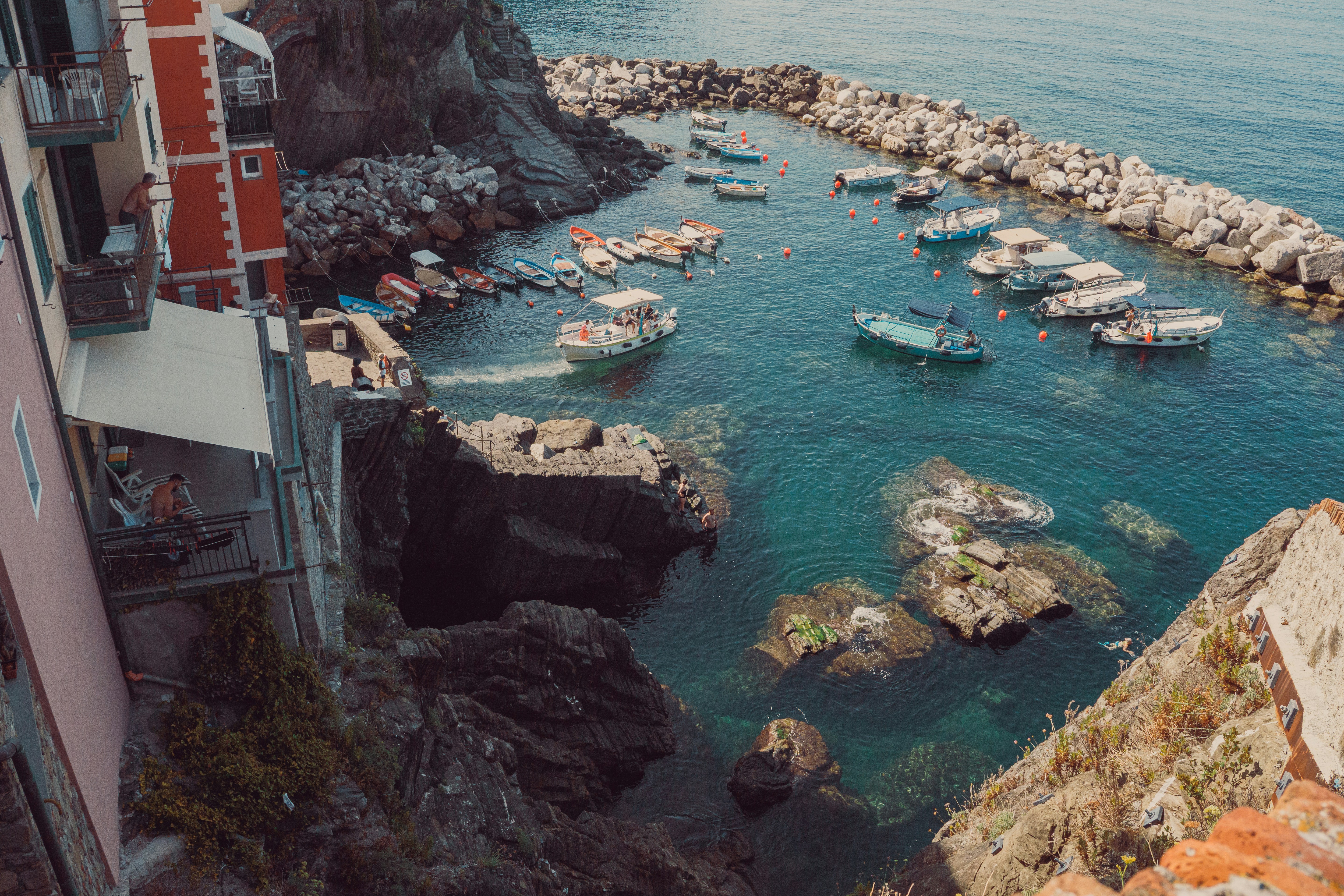 Harbor of Quiet blue: boats at the rocky inlet