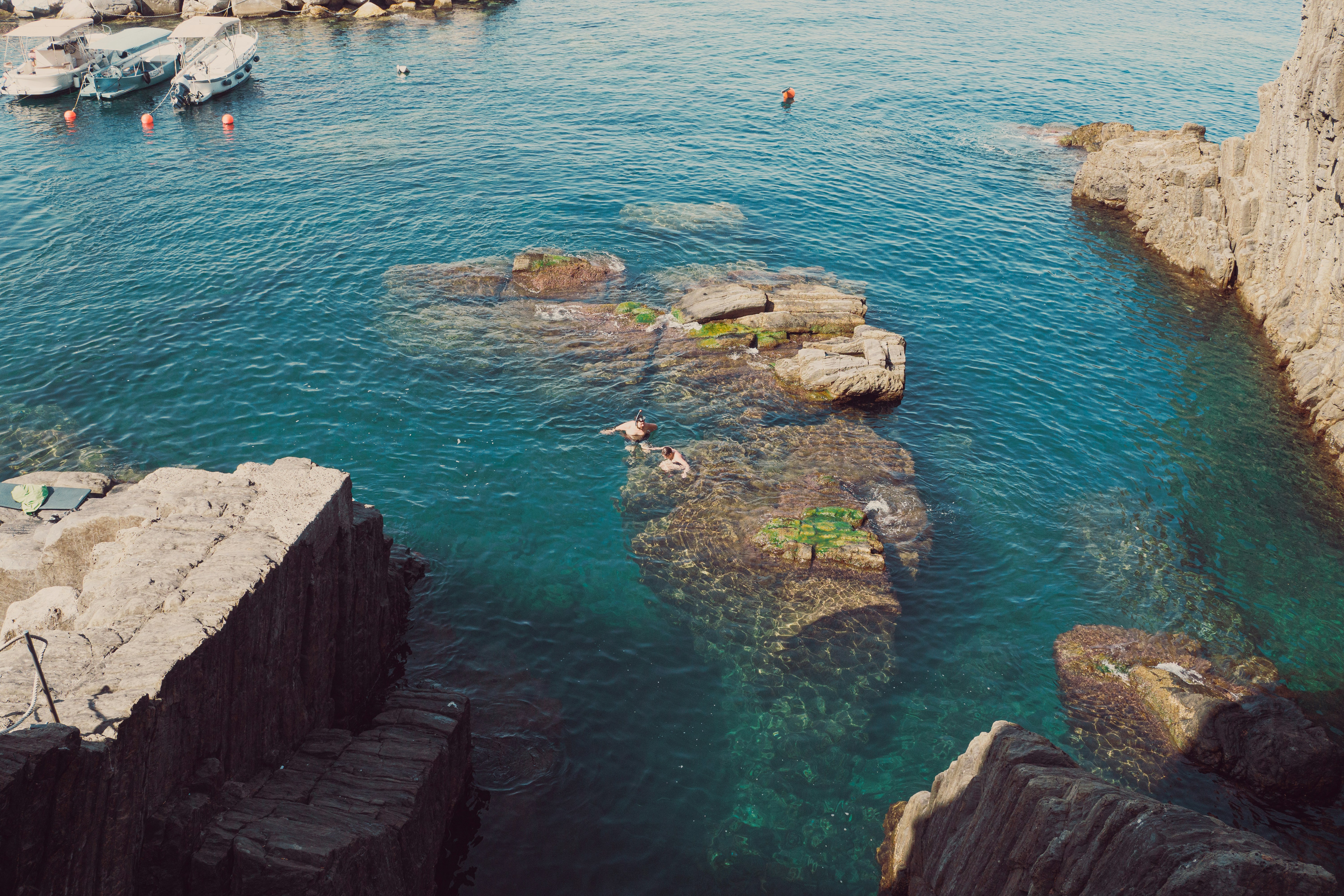Emerald Steps: A Coastal Stairway Descends to Clear Water