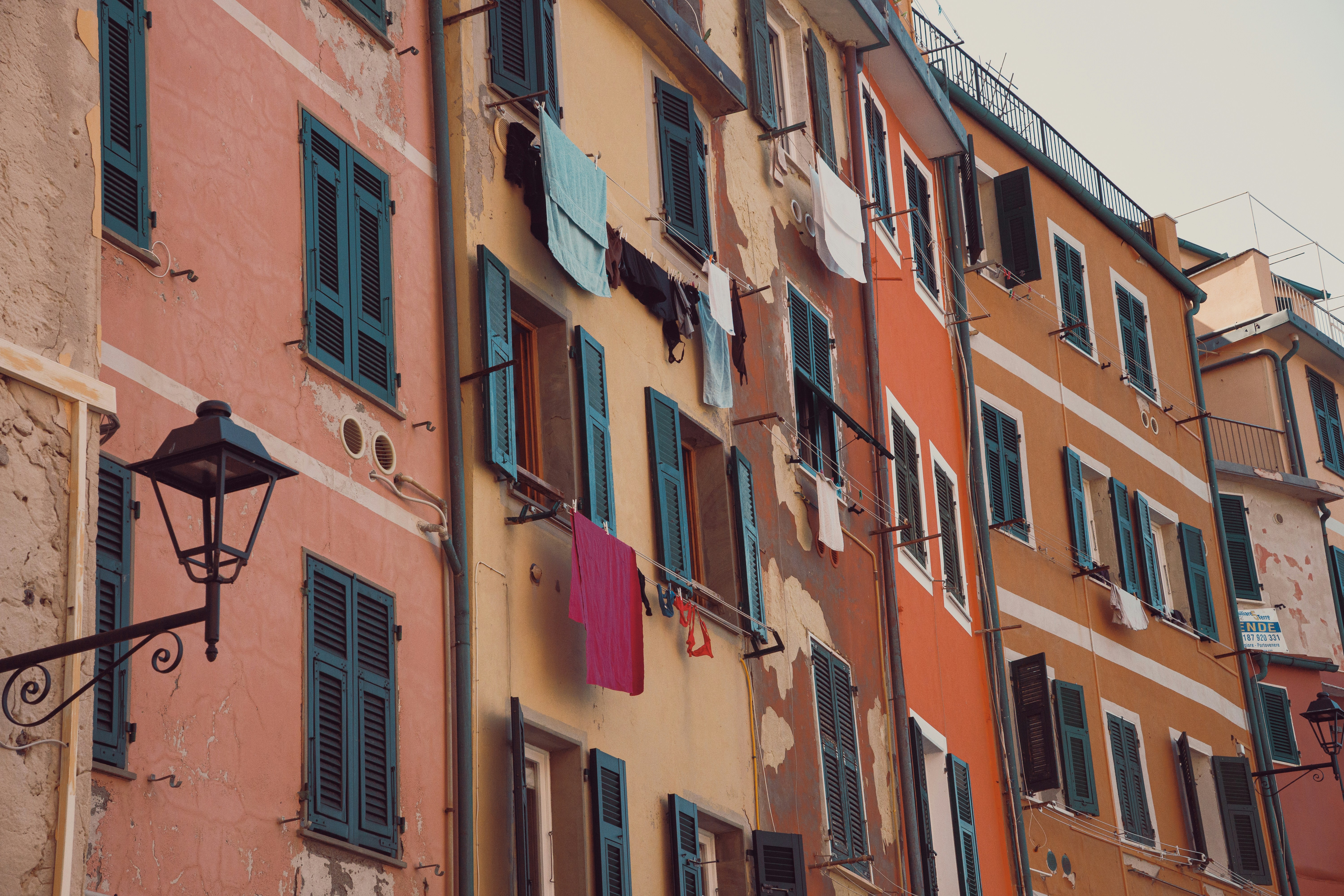 Pastel Facades and Laundry Lines: A Quiet Italian Alley