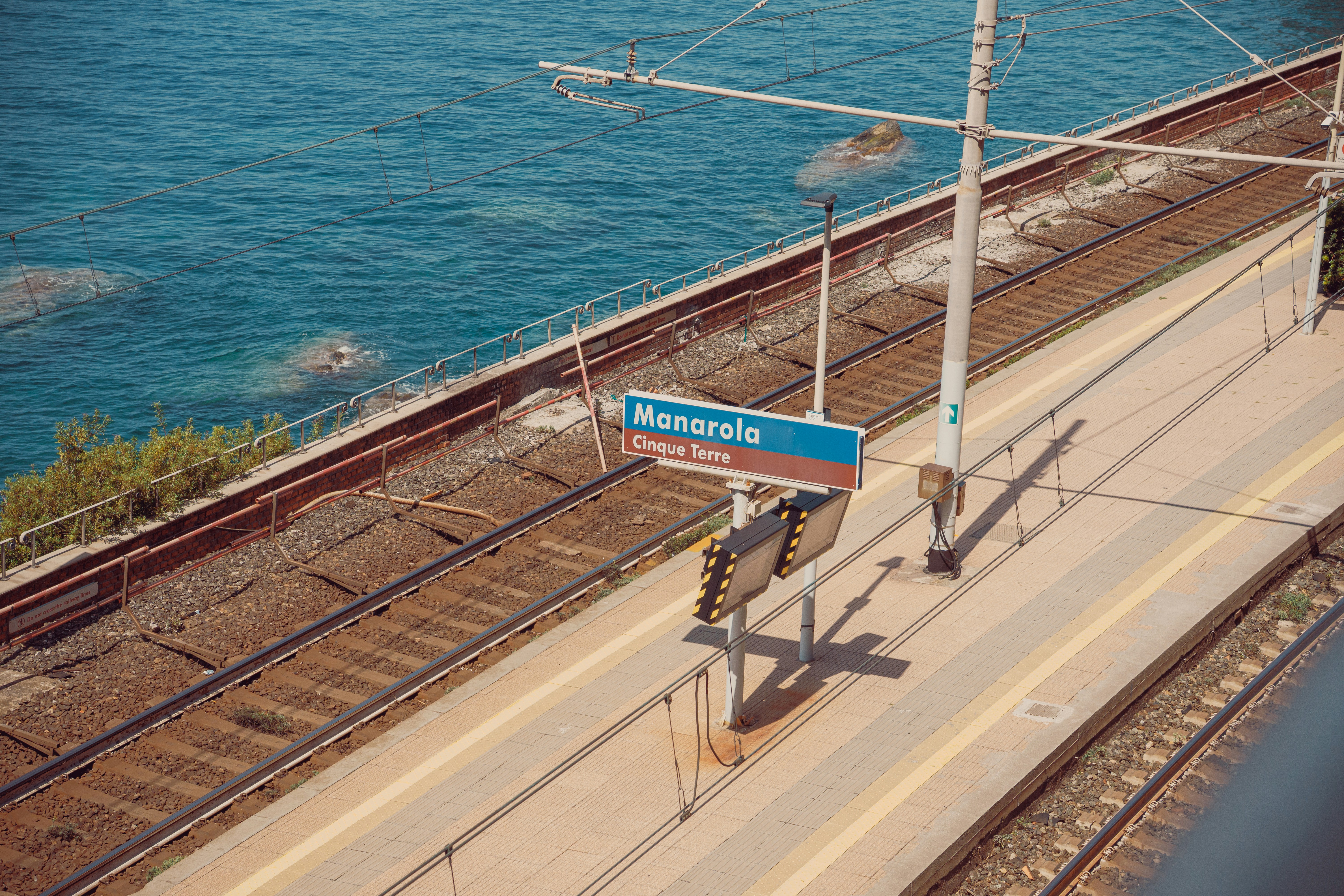 Sunlit Platform at Manoarola Train Station