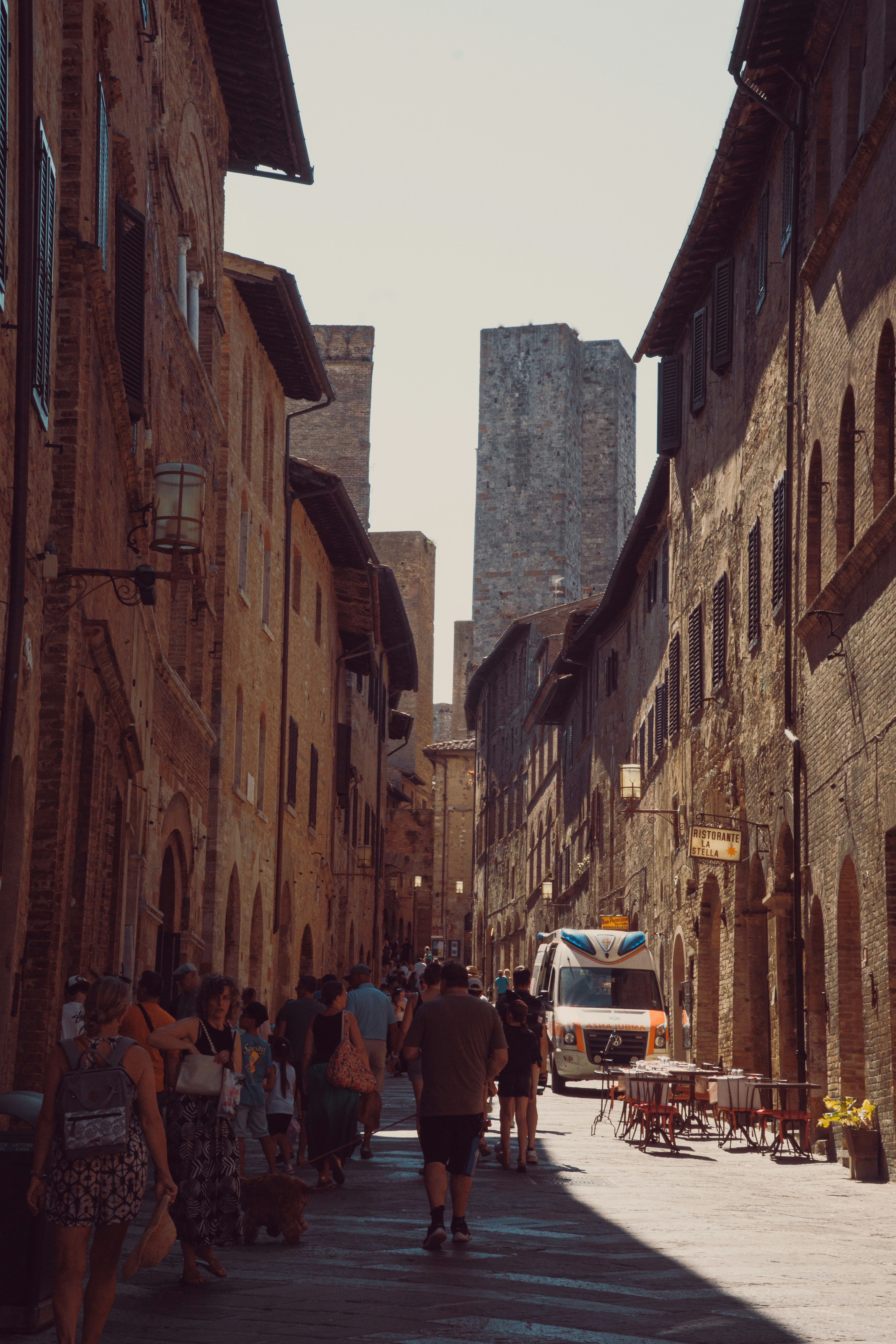 Sunlit Piazza in an Ancient Alleyway