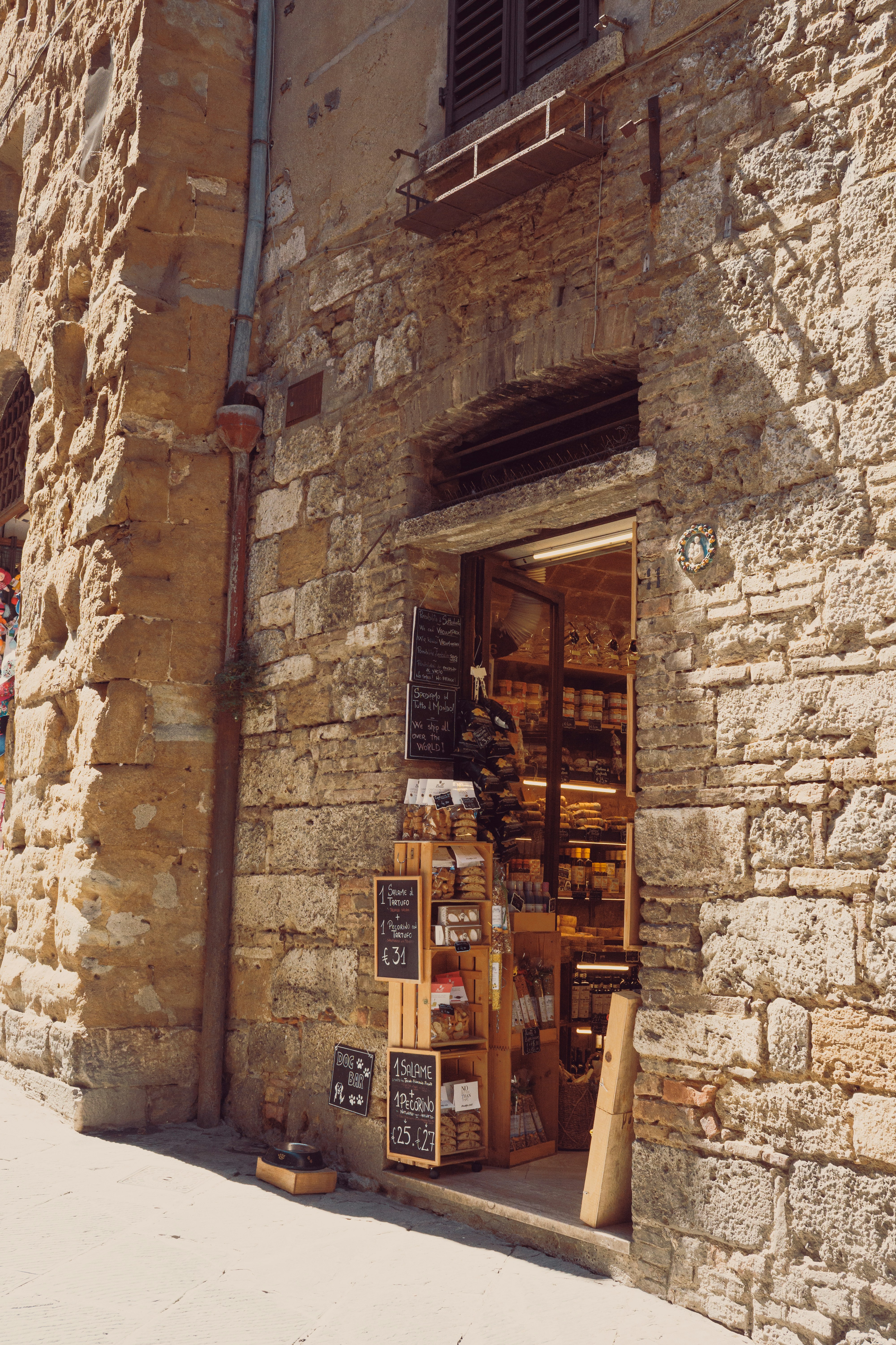 Stone storefront in warm afternoon light