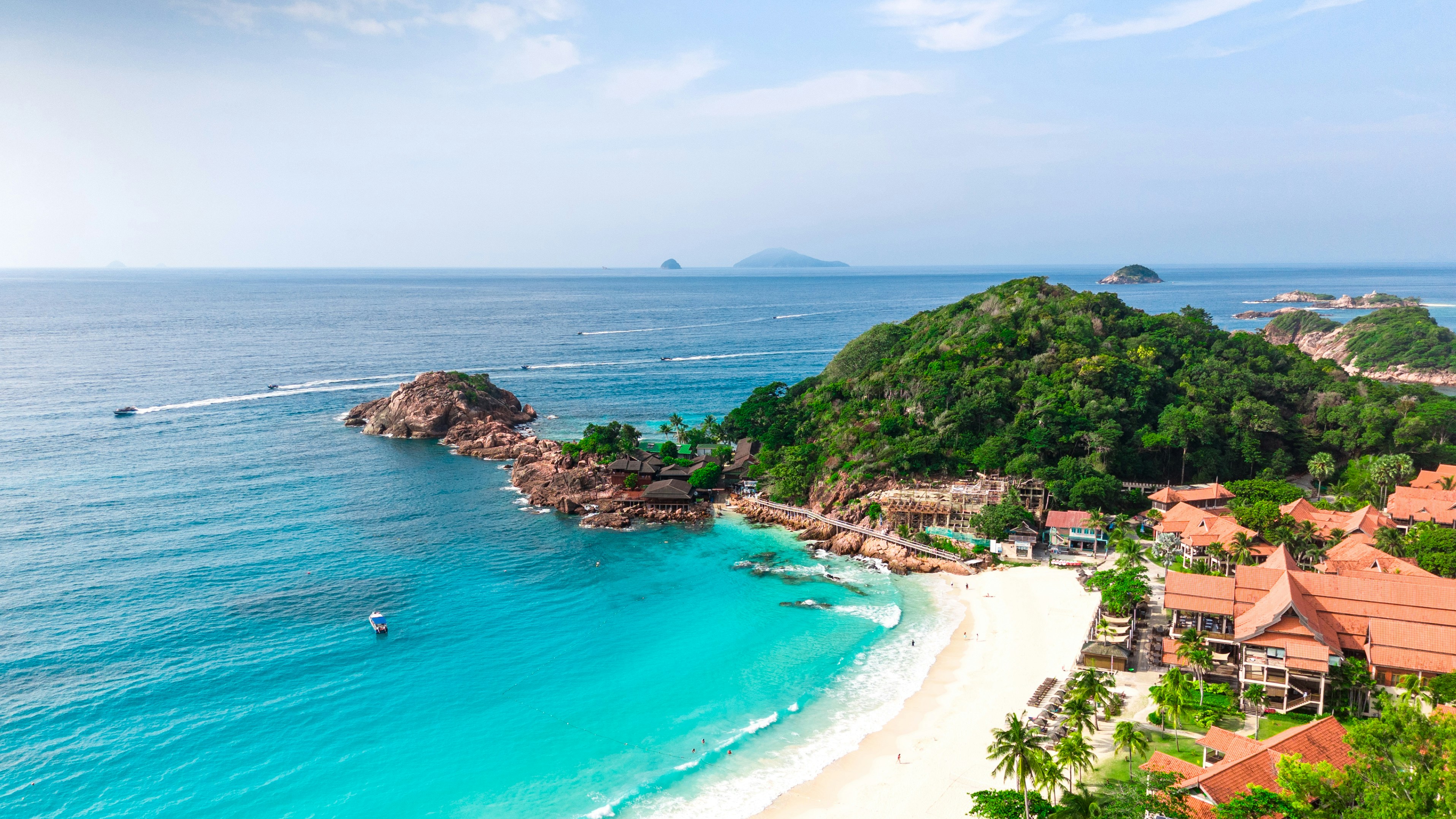 Sunlit Cove: Aerial View of a Tropical Peninsula