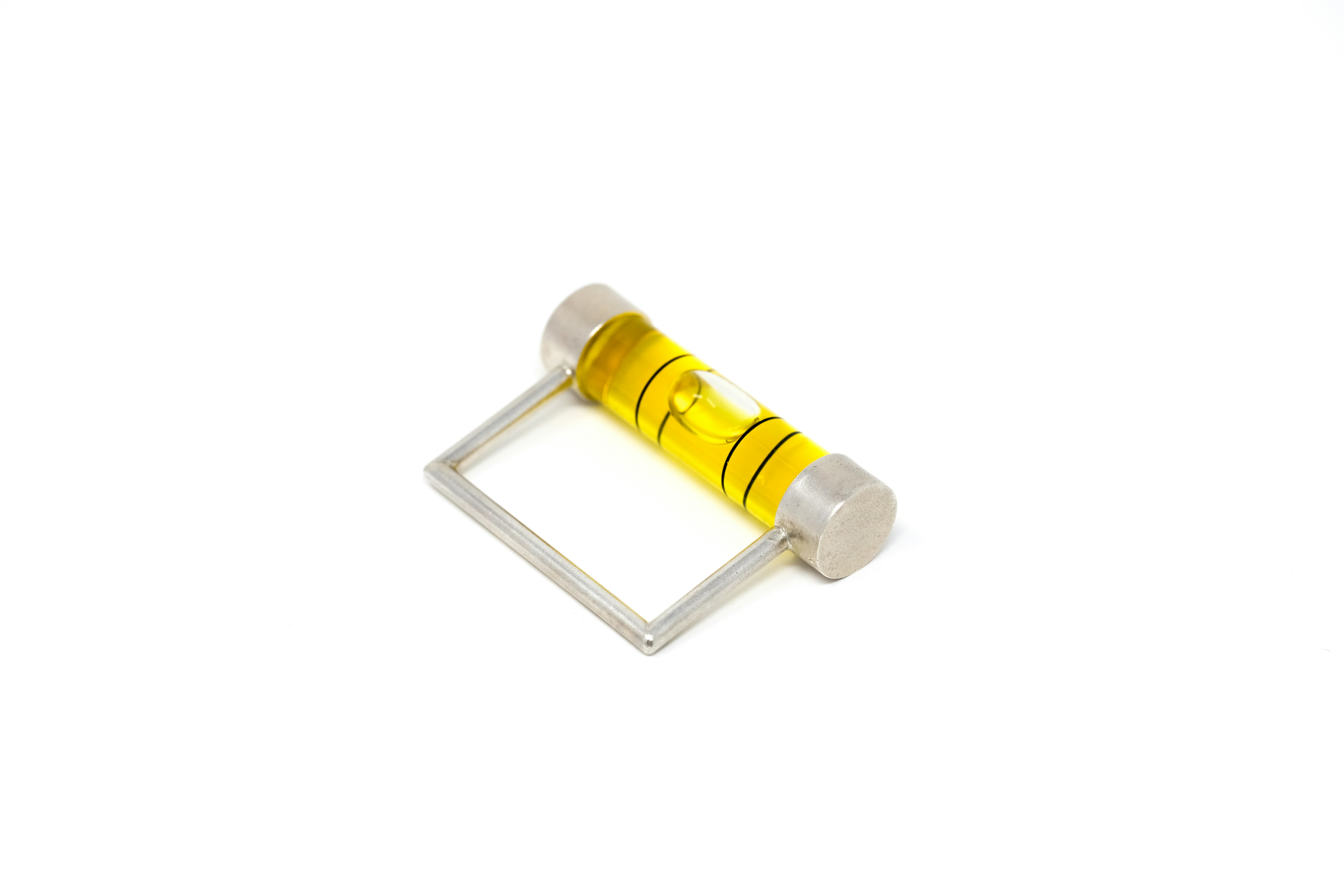 Tiny Yellow Spirit Level, Big Precision: A Close-Up of a Tool Core
