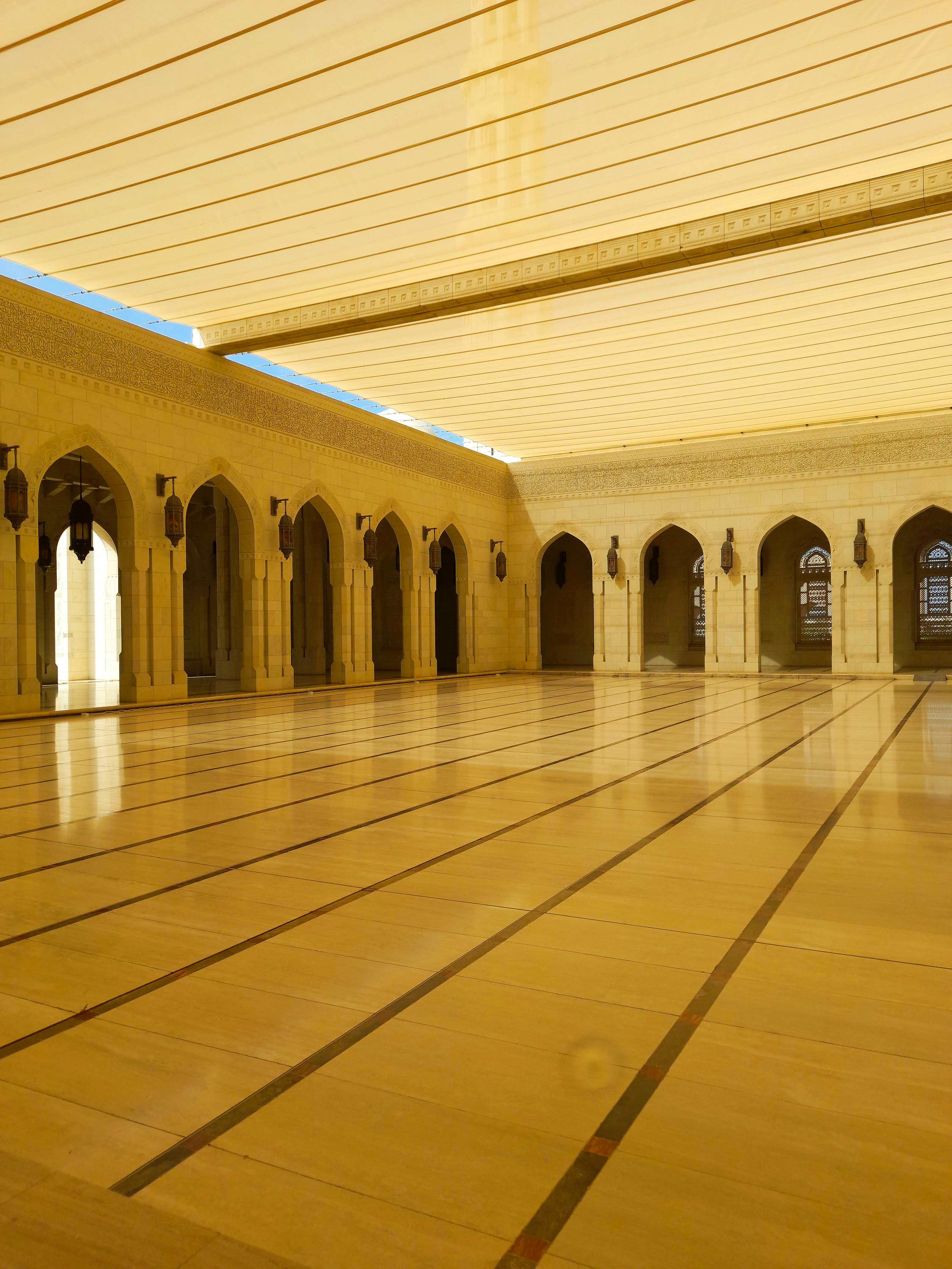 Golden Atrium: Architectural Symmetry Under a Soft Lantern Roof