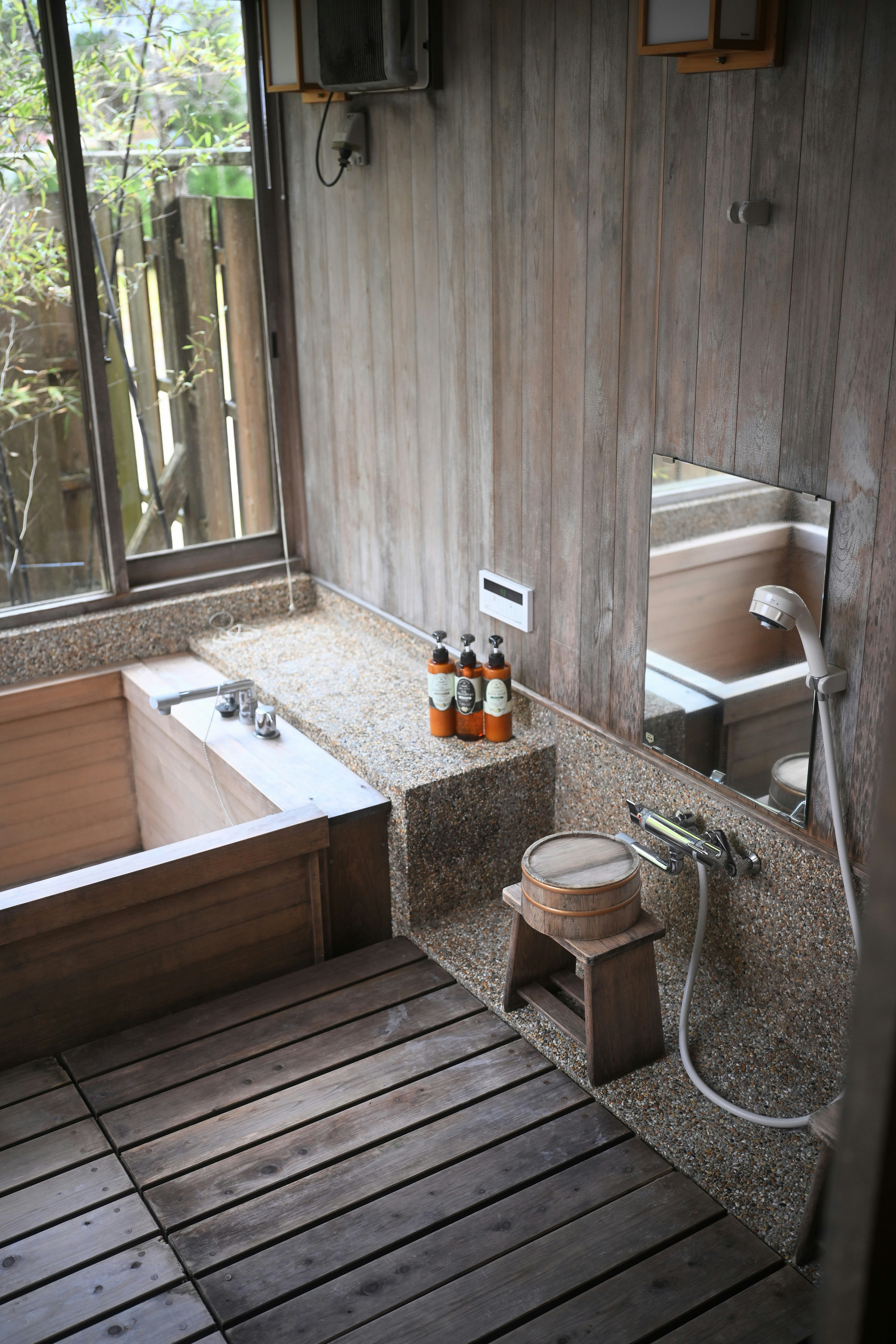Bathing Corner: A Quiet Spa Nook with Bottles by the Sink