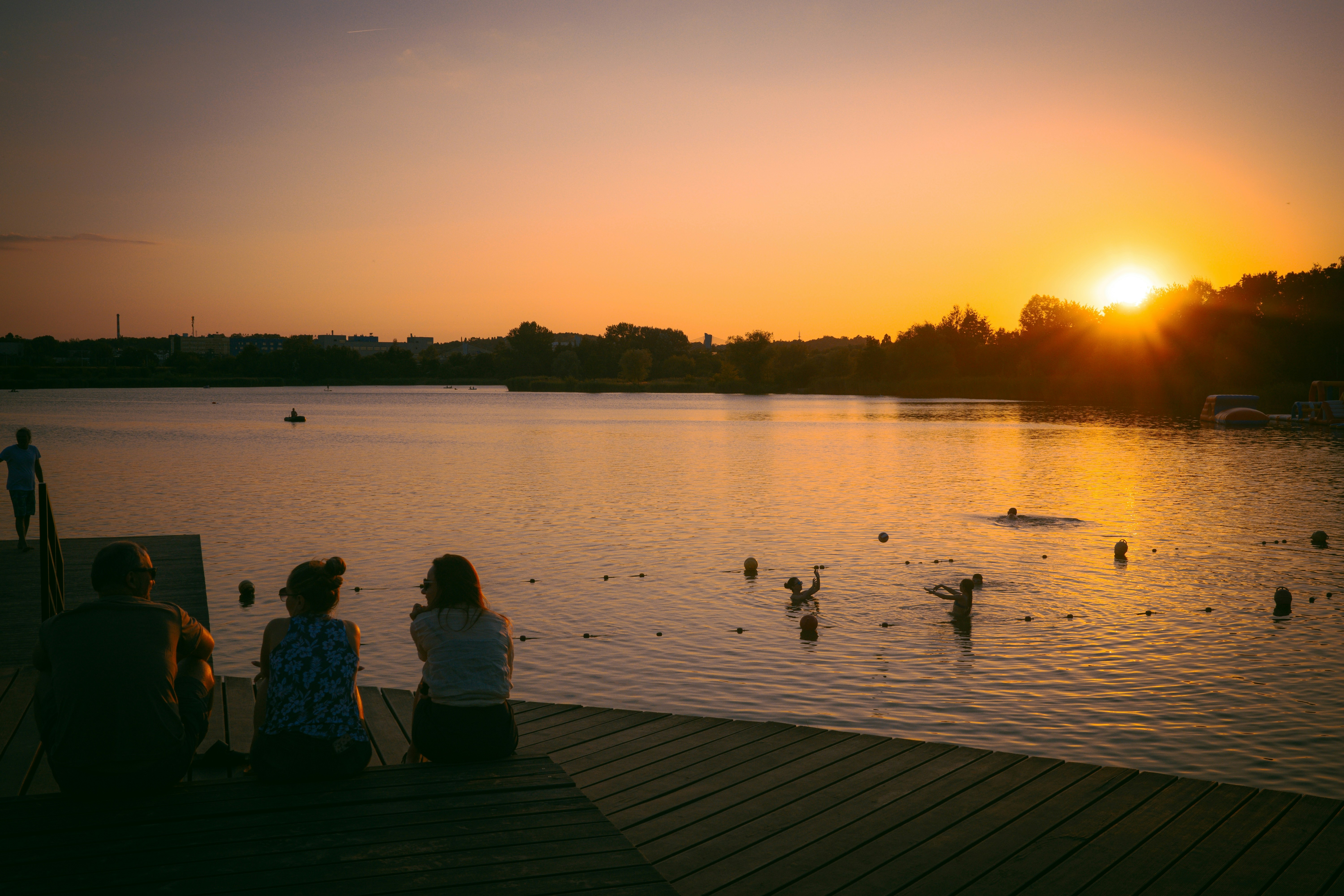 Sundown by the Dock: Friends at the Waterfront