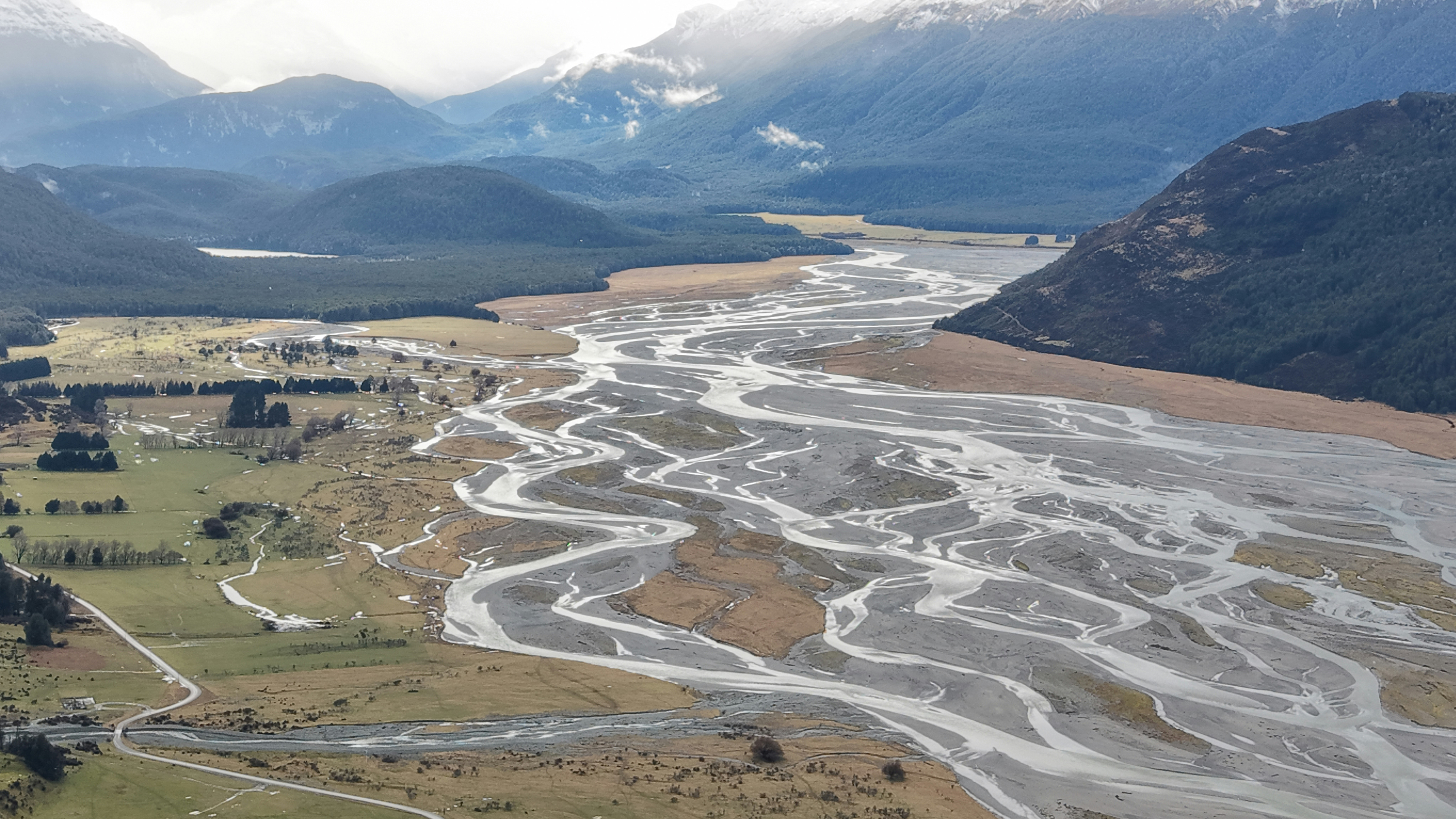 River Vein: A Valley’s Meandering Silver Thread Through Mountain Shores