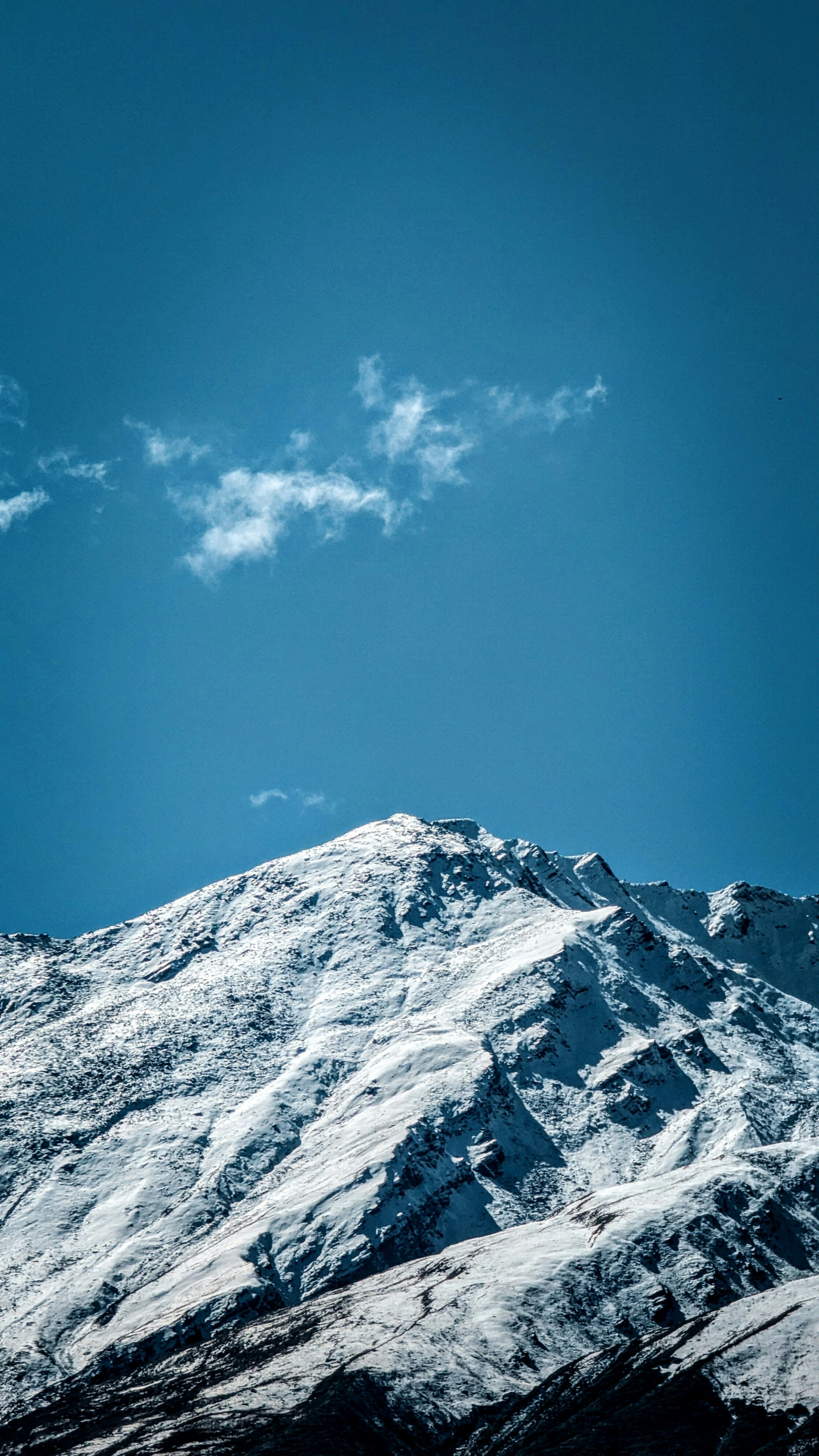 Snow-Crowned Summit Under a Clear Alpine Sky
