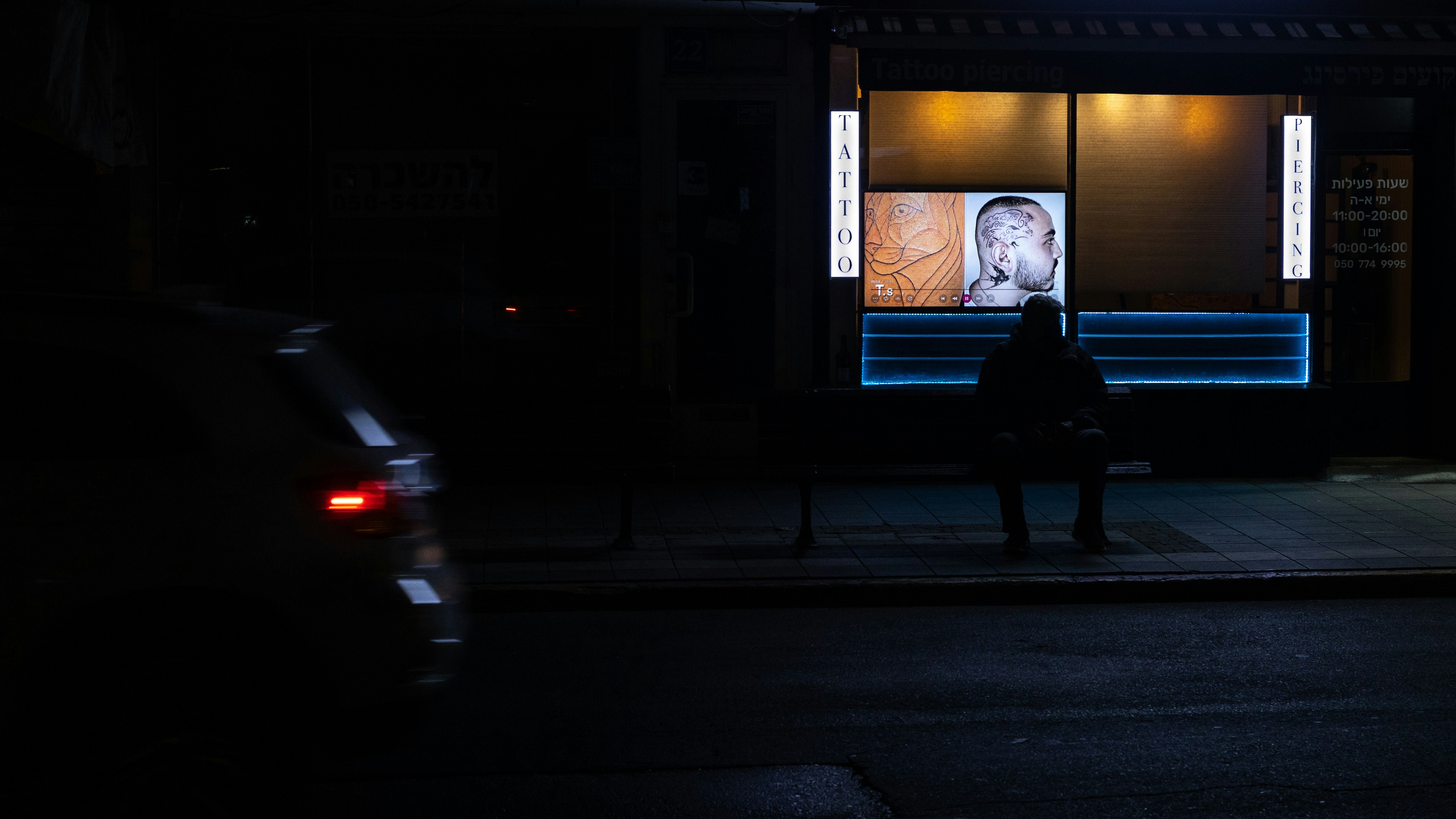 Neon Window Under Streetlight: A Quiet Night Pause