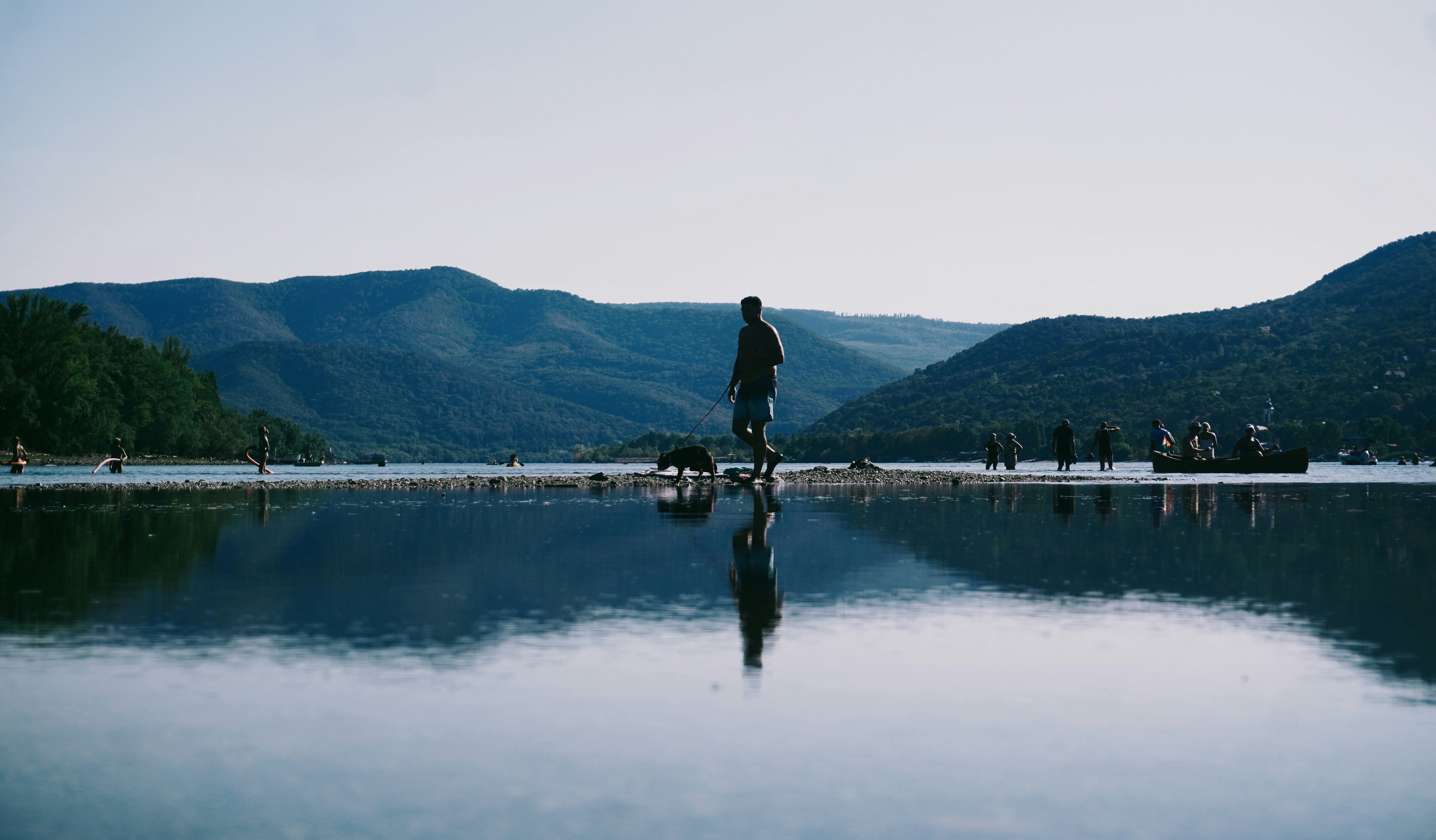 Solitary Runner on a Glassy Lake Ridge