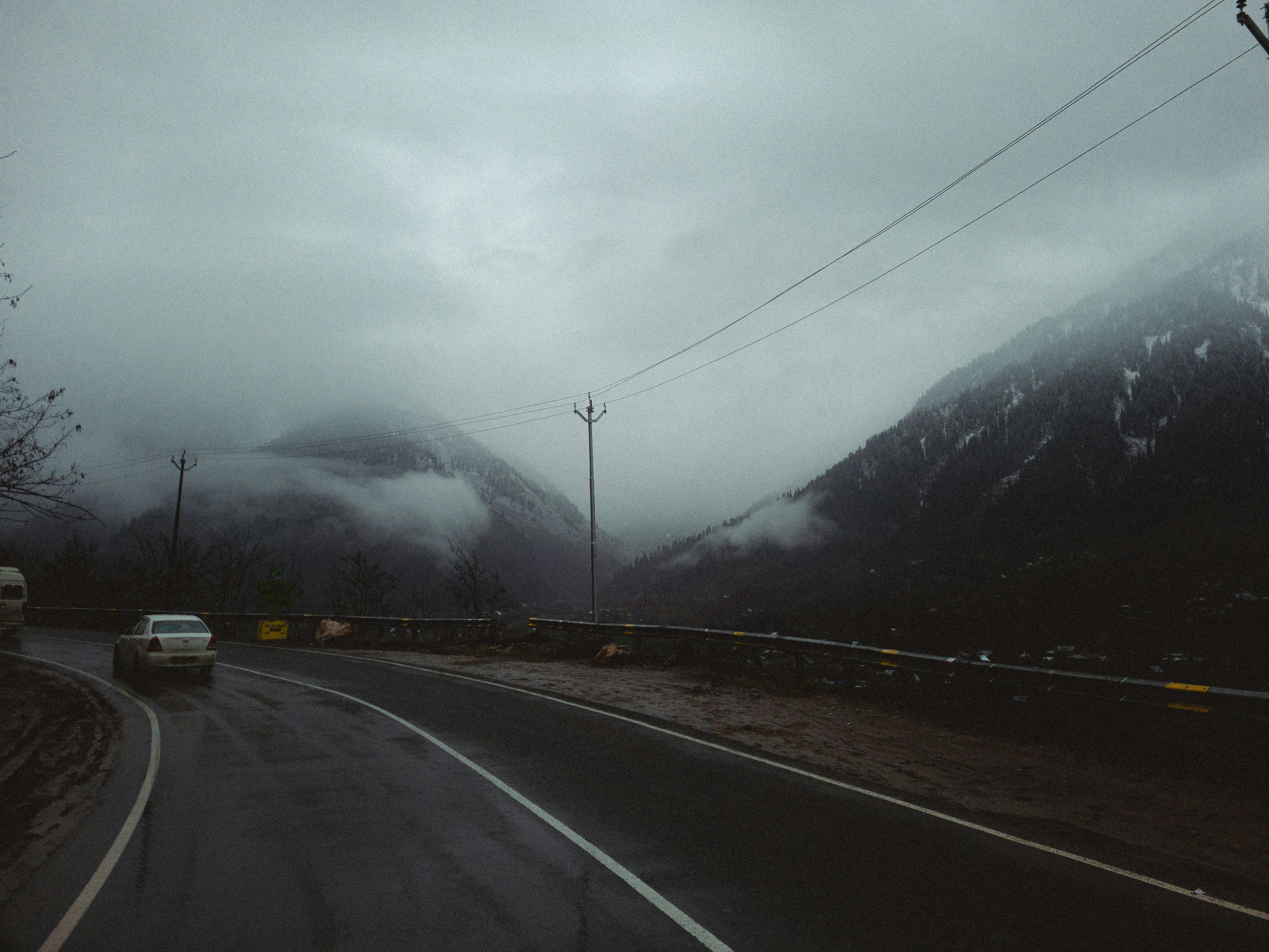 Misty Mountain Pass: A Quiet Descent Along a Wet Mountain Road
