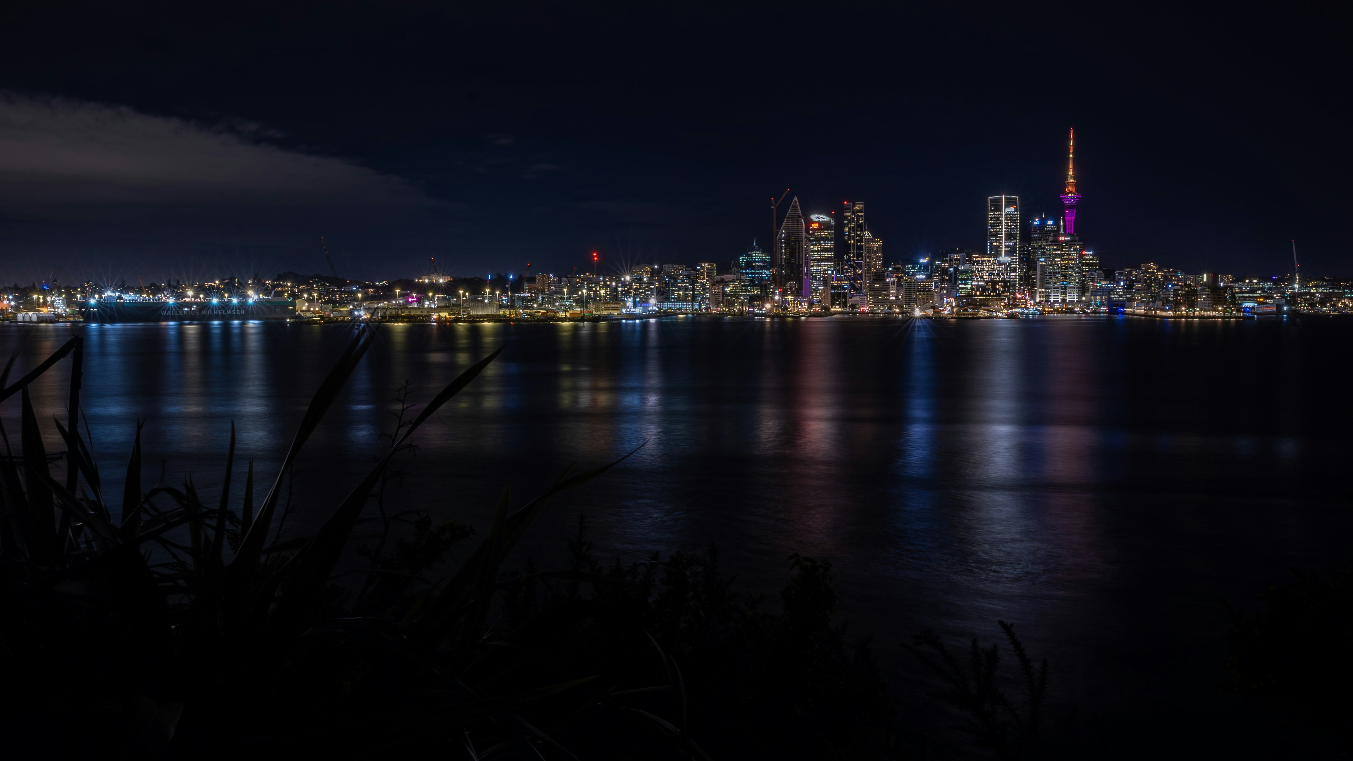 Midnight Skyline: Reflections on a Quiet Harbor