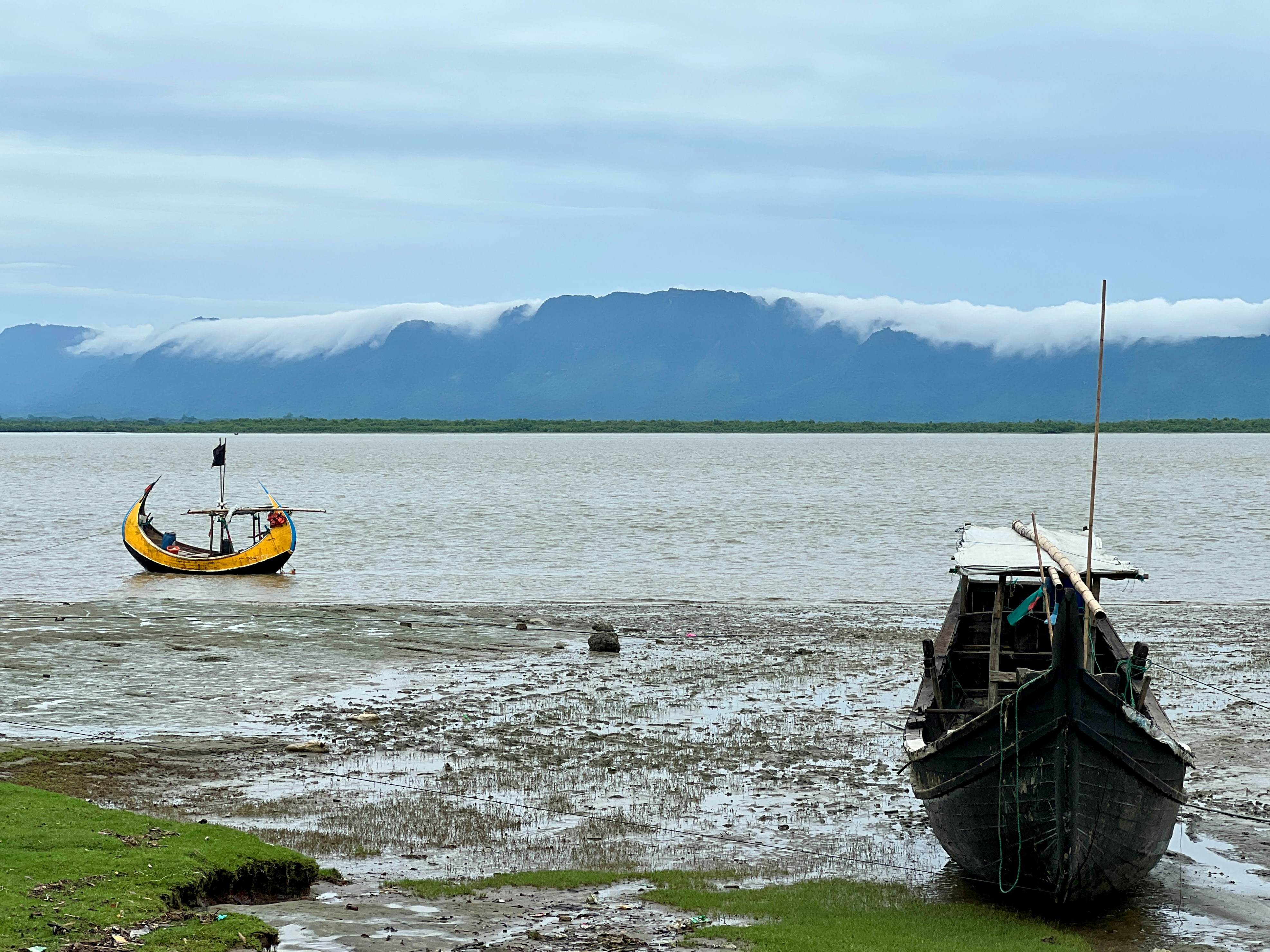 Harbor Echoes: Boats Rest at the Quiet Shallow Estuary