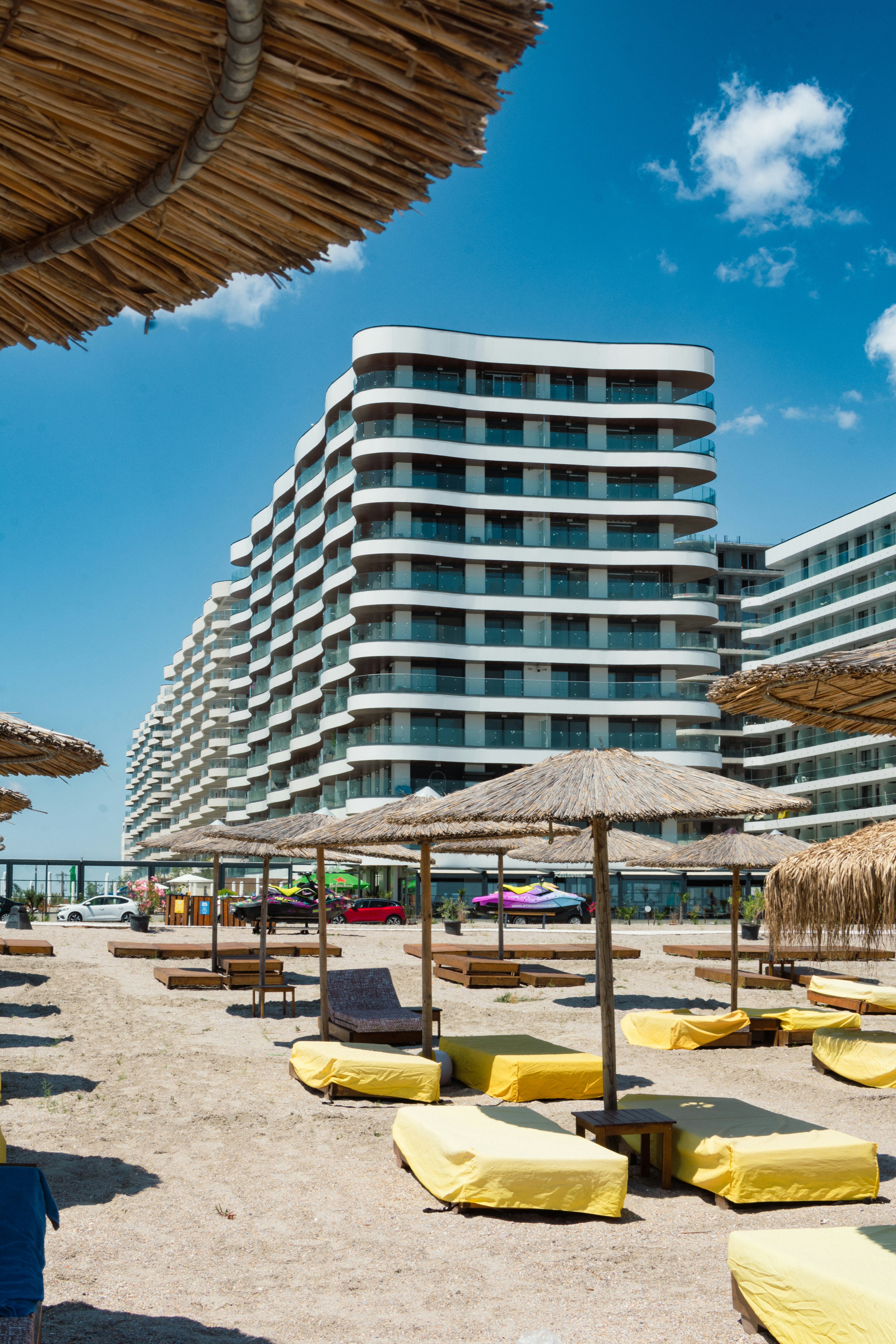 Beachfront Atrium: Modern Curves Meet Sunlit Sand
