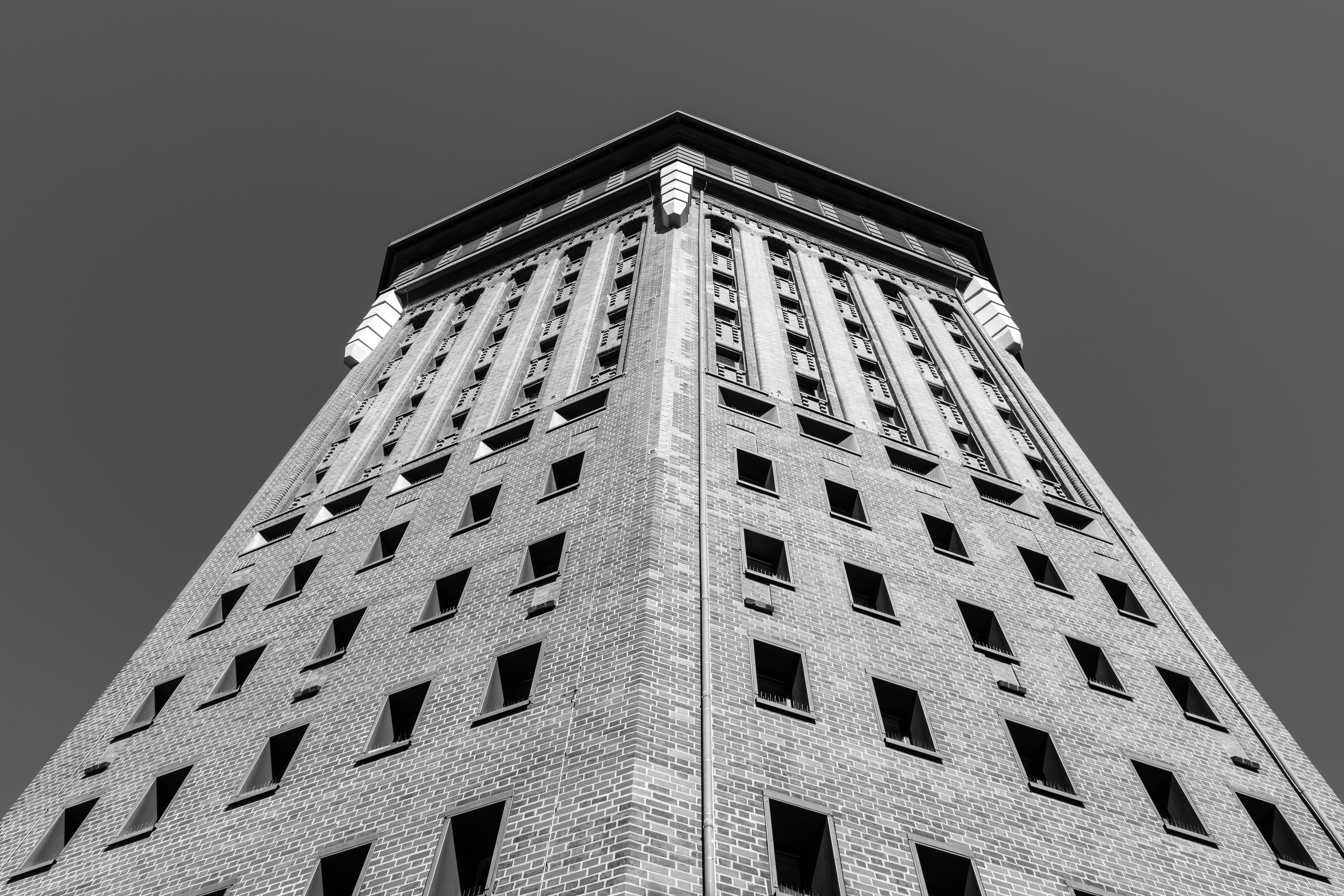 Skyward Monolith: A Brick Tower Reaching the Sky