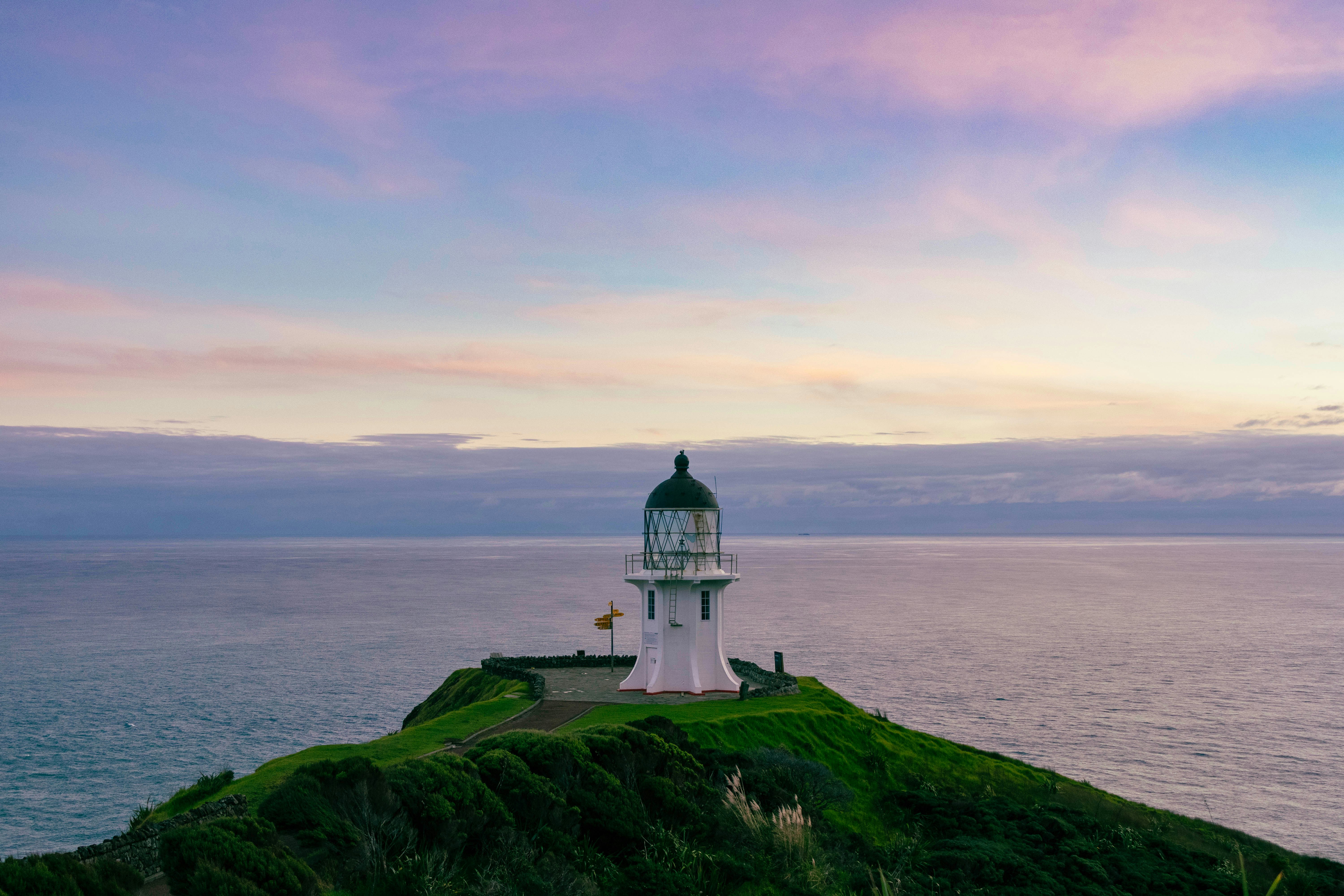 Beacon at Dusk: A Lone Lighthouse Guarding the Sea