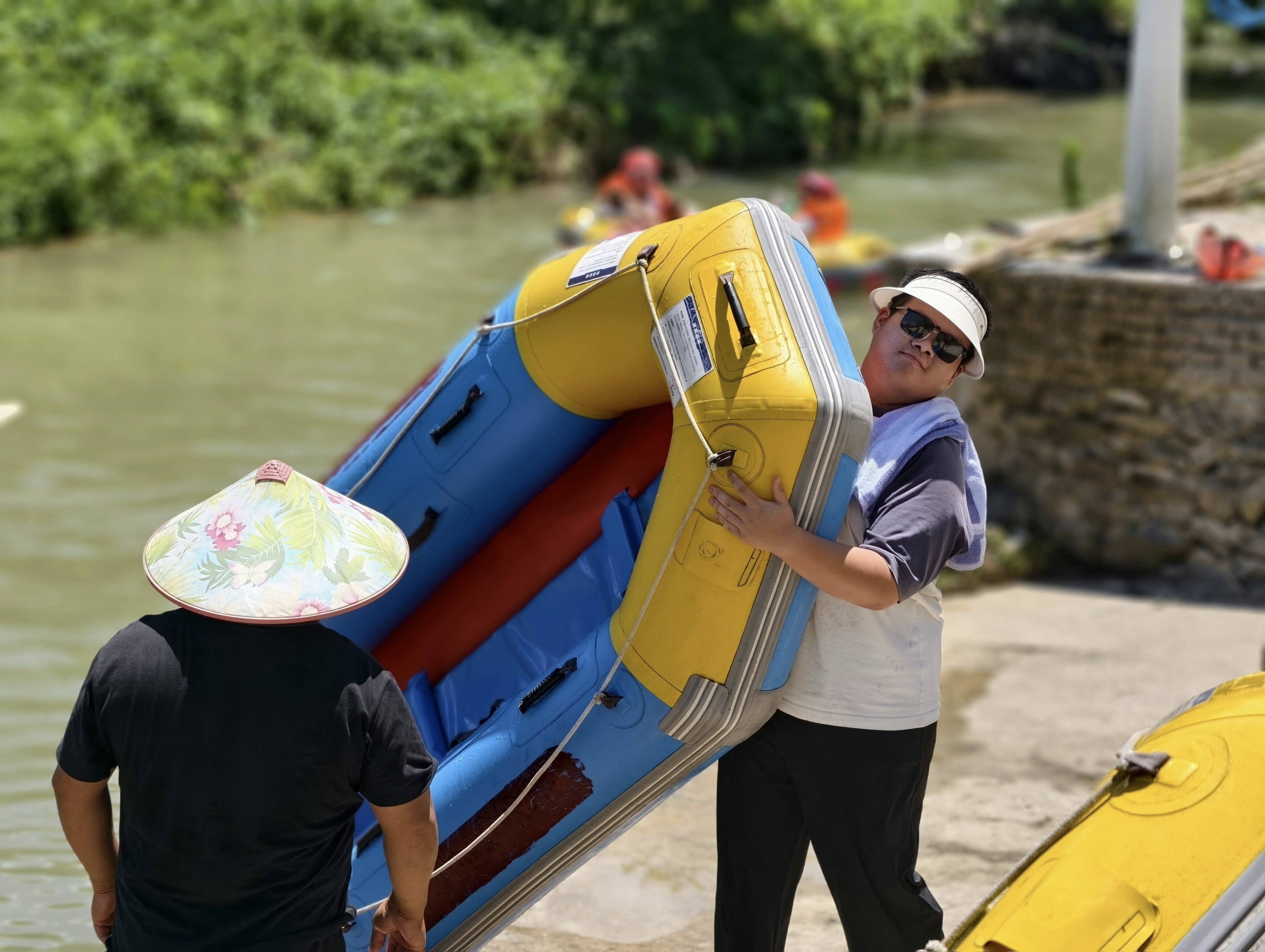 Inflatable Rescue: A Riverbank Crew Handles a Brightyl Yellow Dinghy