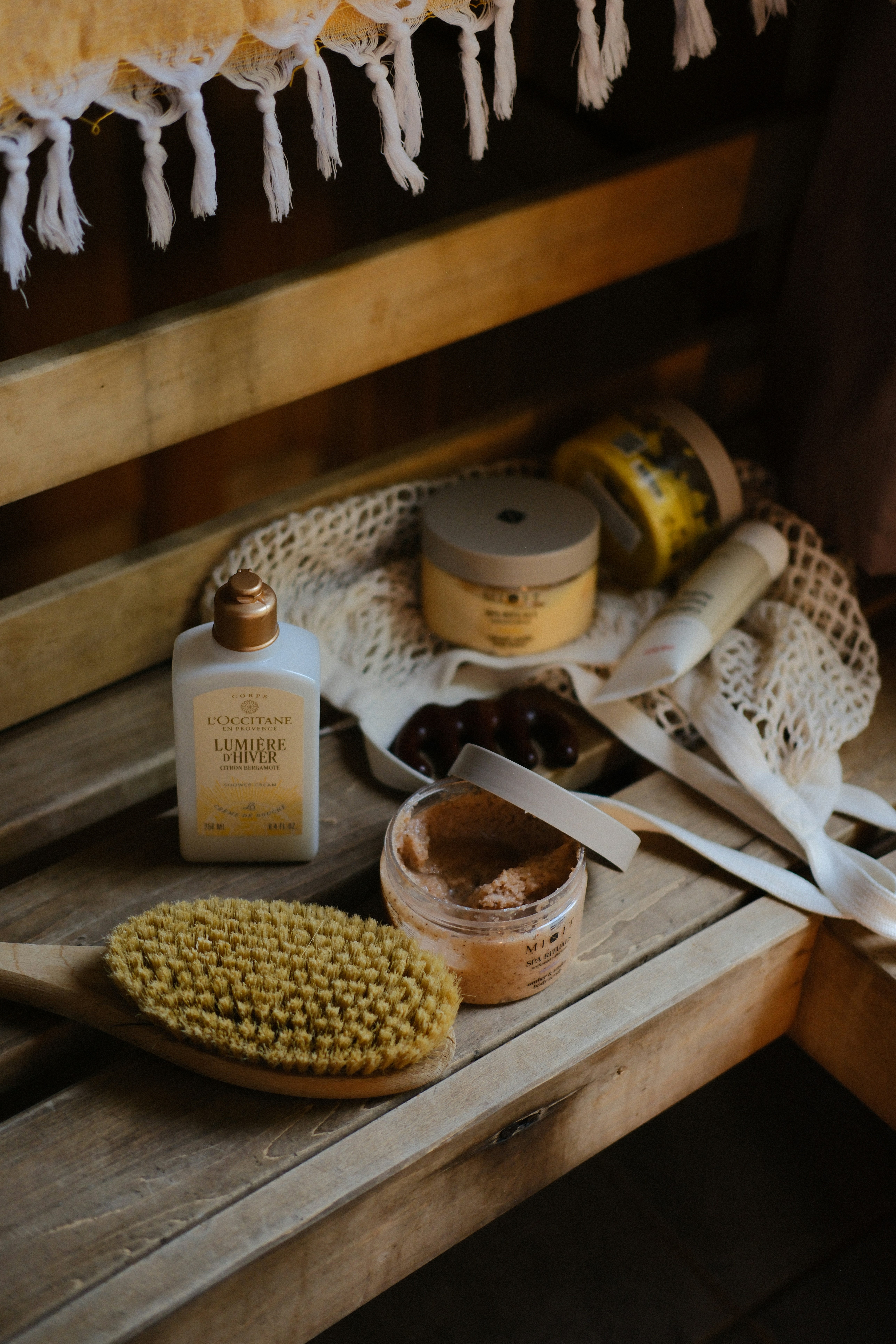 Cozy Vanity: Skin-care Treasures Resting on a Weathered Shelf