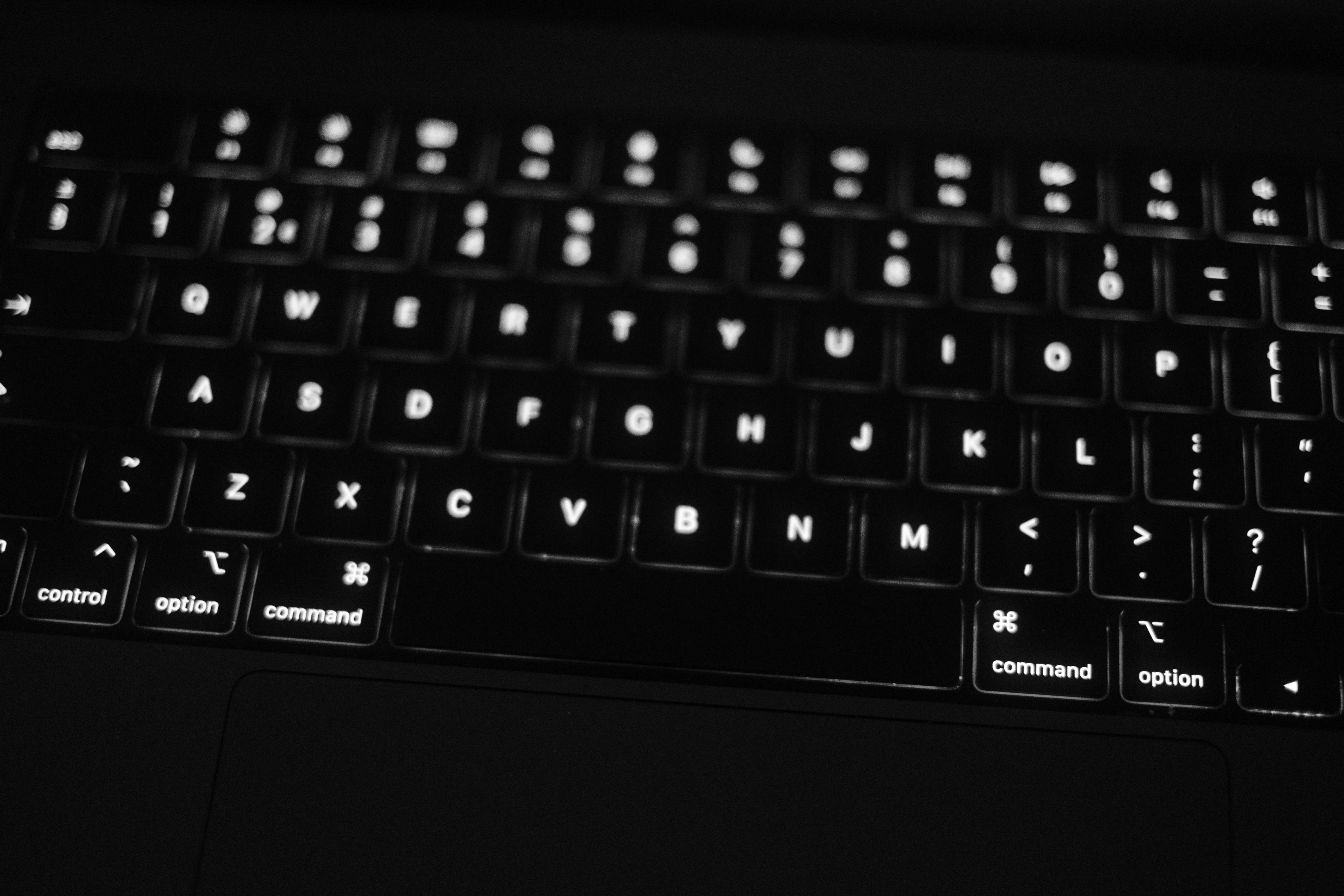 Midnight Keys: A Quiet Close-Up of a Backlit Keyboard