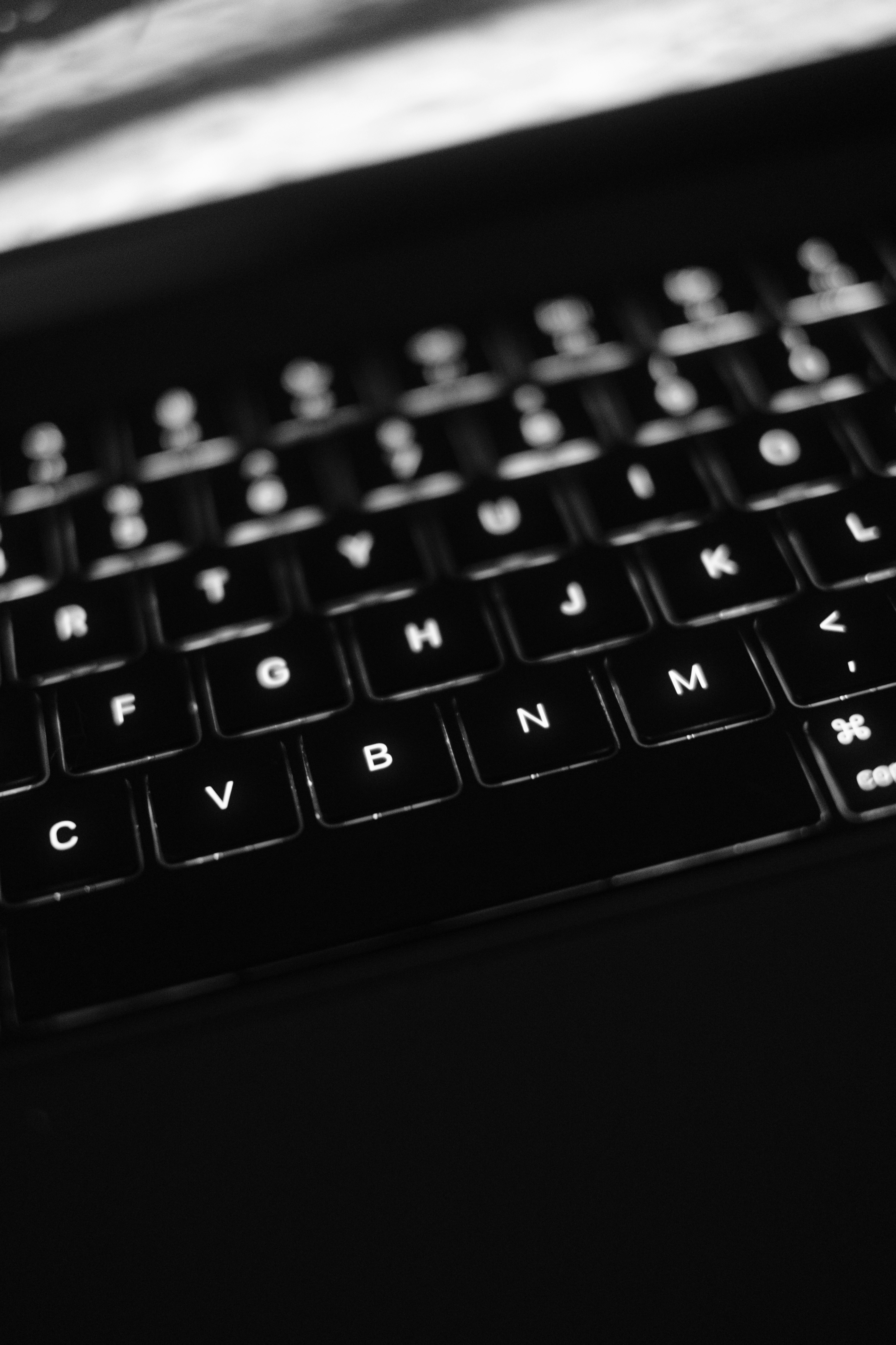Backlit Keys: A Quiet Moment on the Keyboard