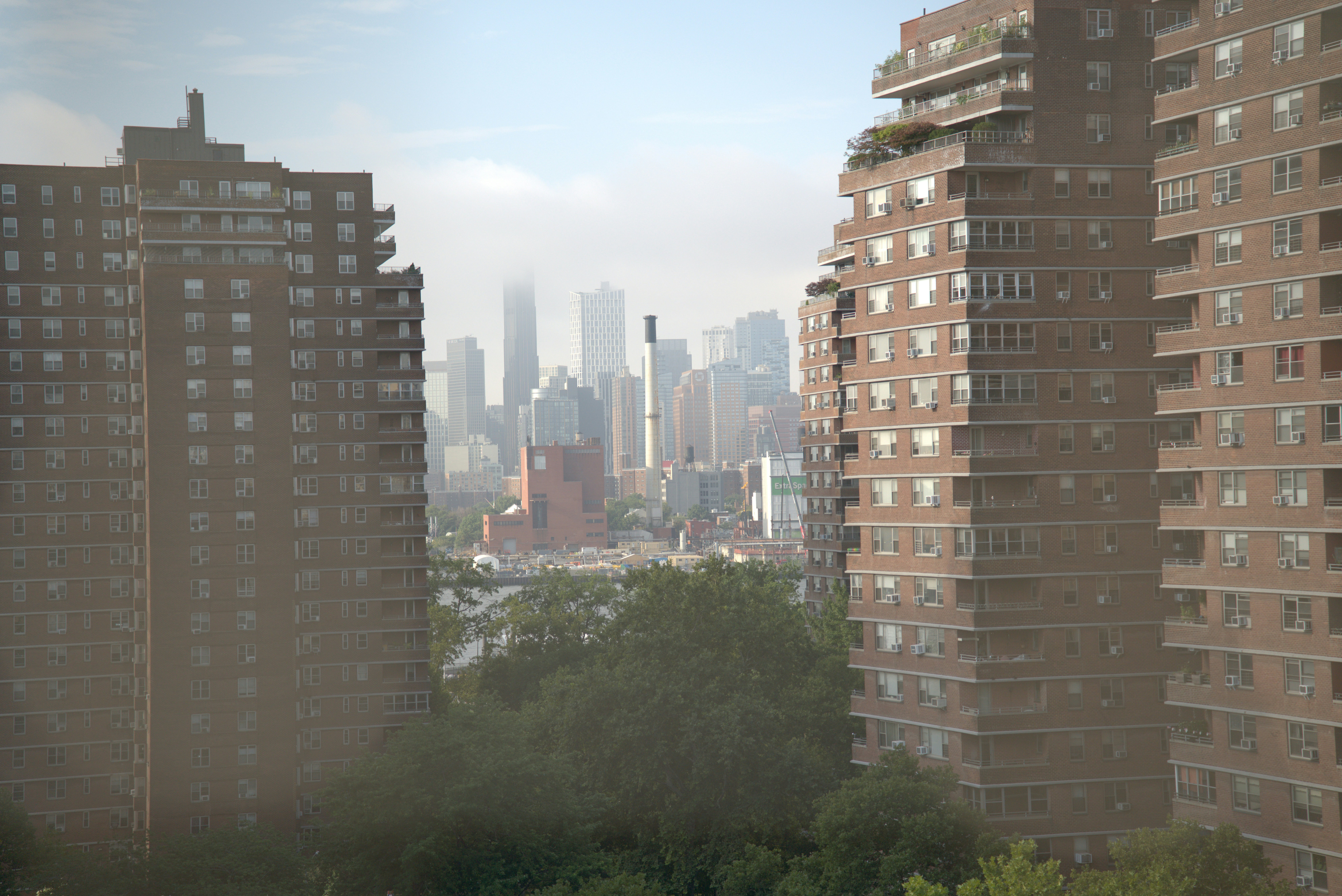 Between Towers: City Skyline Peeking Through the Gap