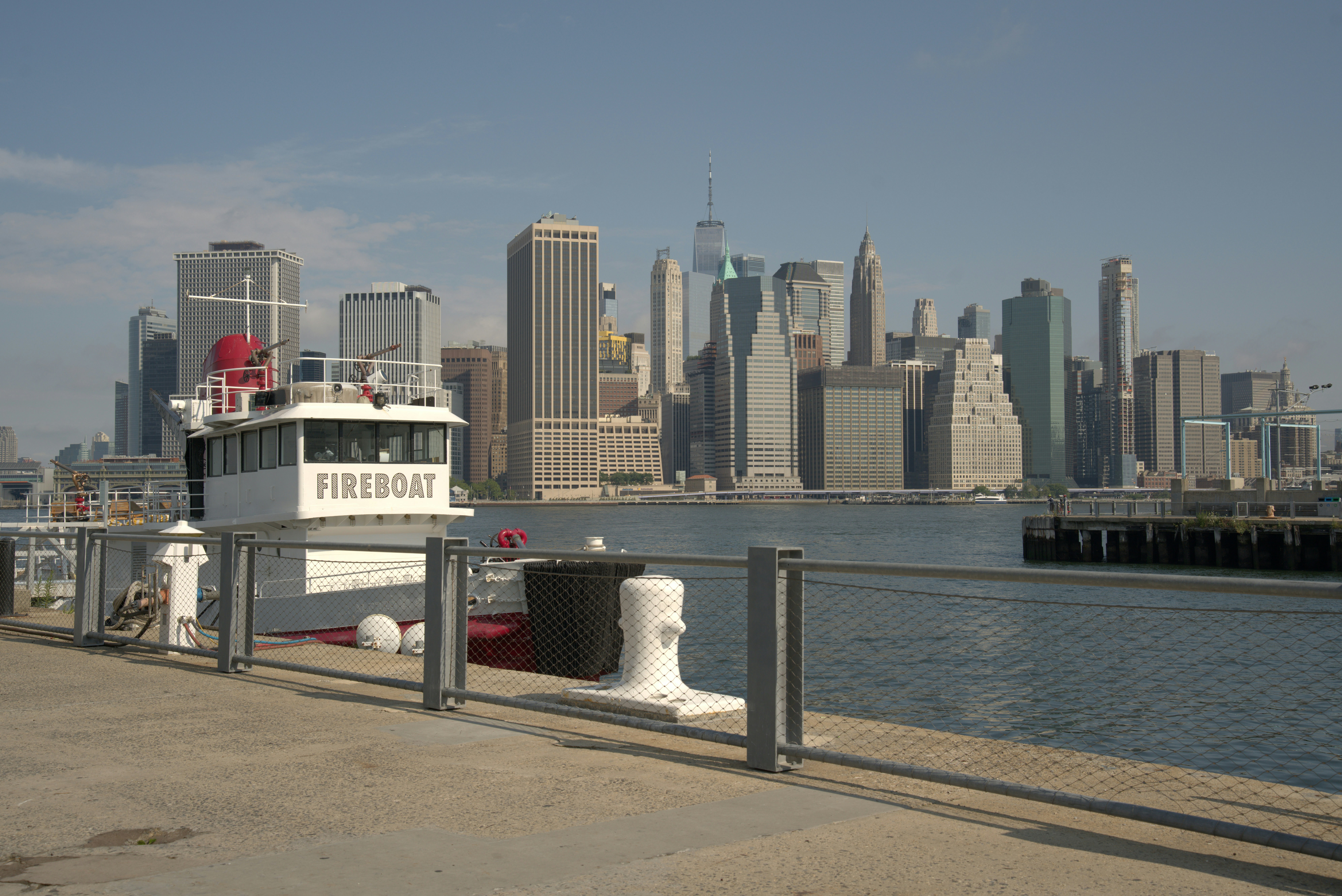 City Pier Vista: Waterfront Foreground with Skyline Backdrop