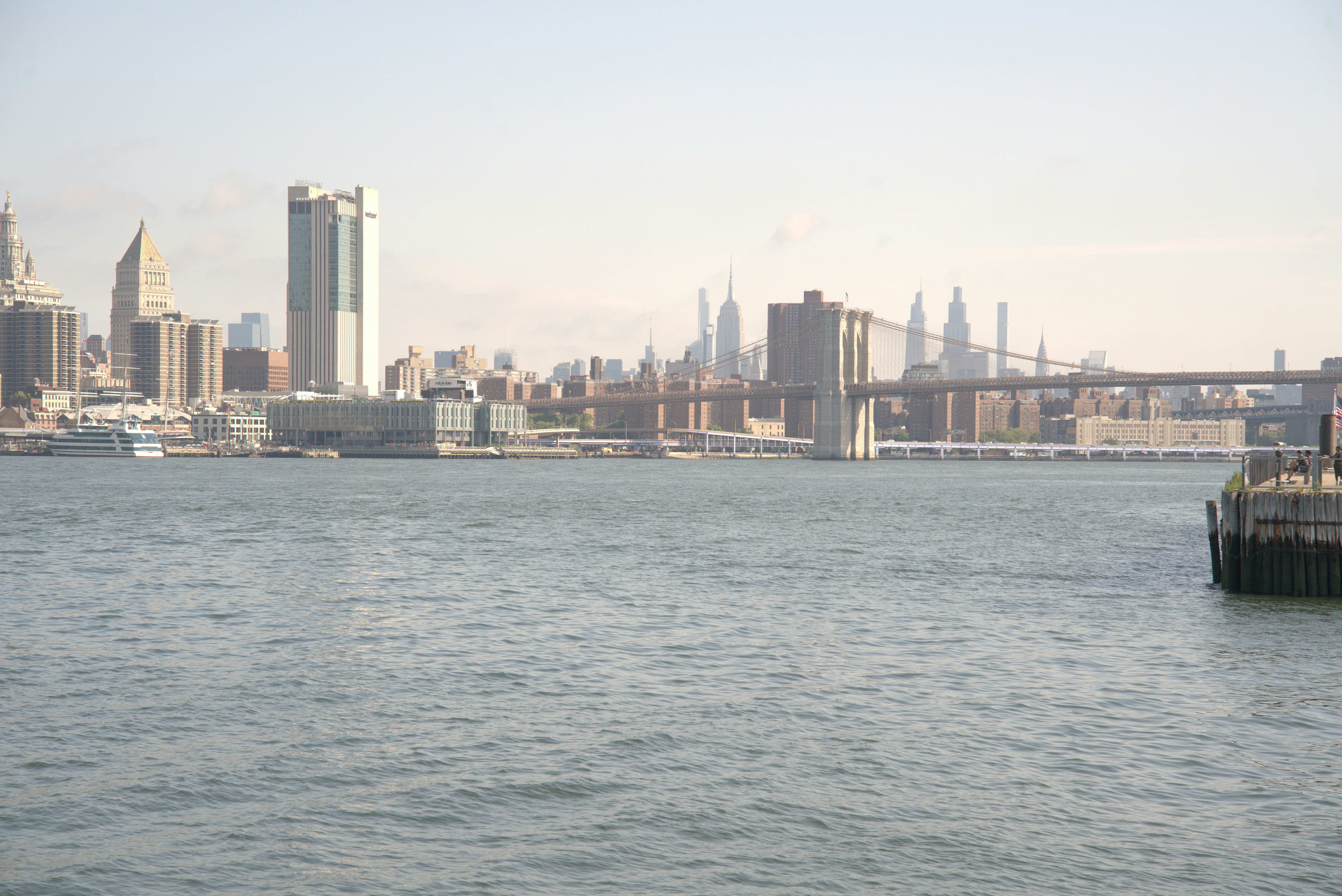 City Horizon Across the River: A Quiet Skyline