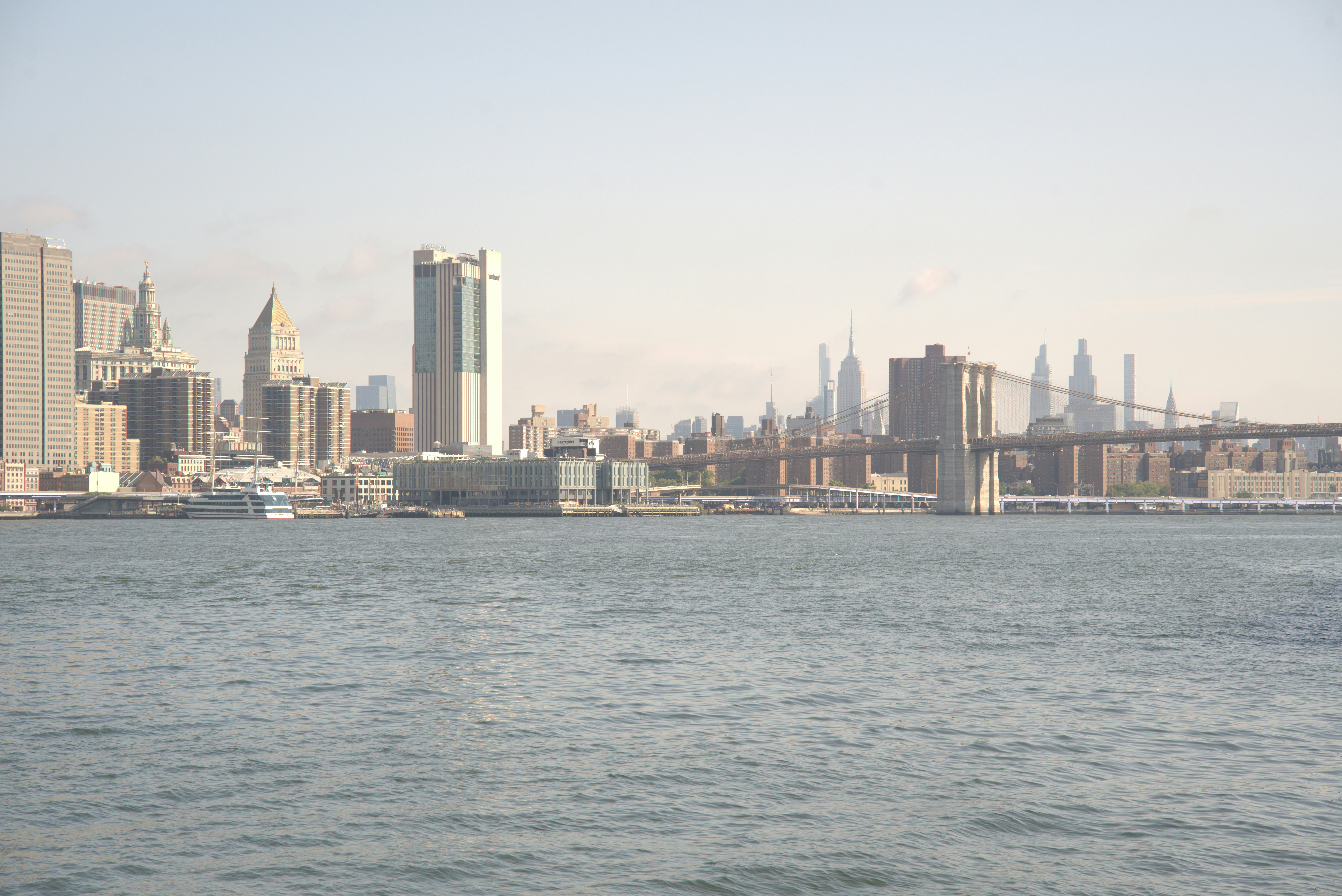 Harbor Skyline: A Quiet City Awakens at Distant Dawn