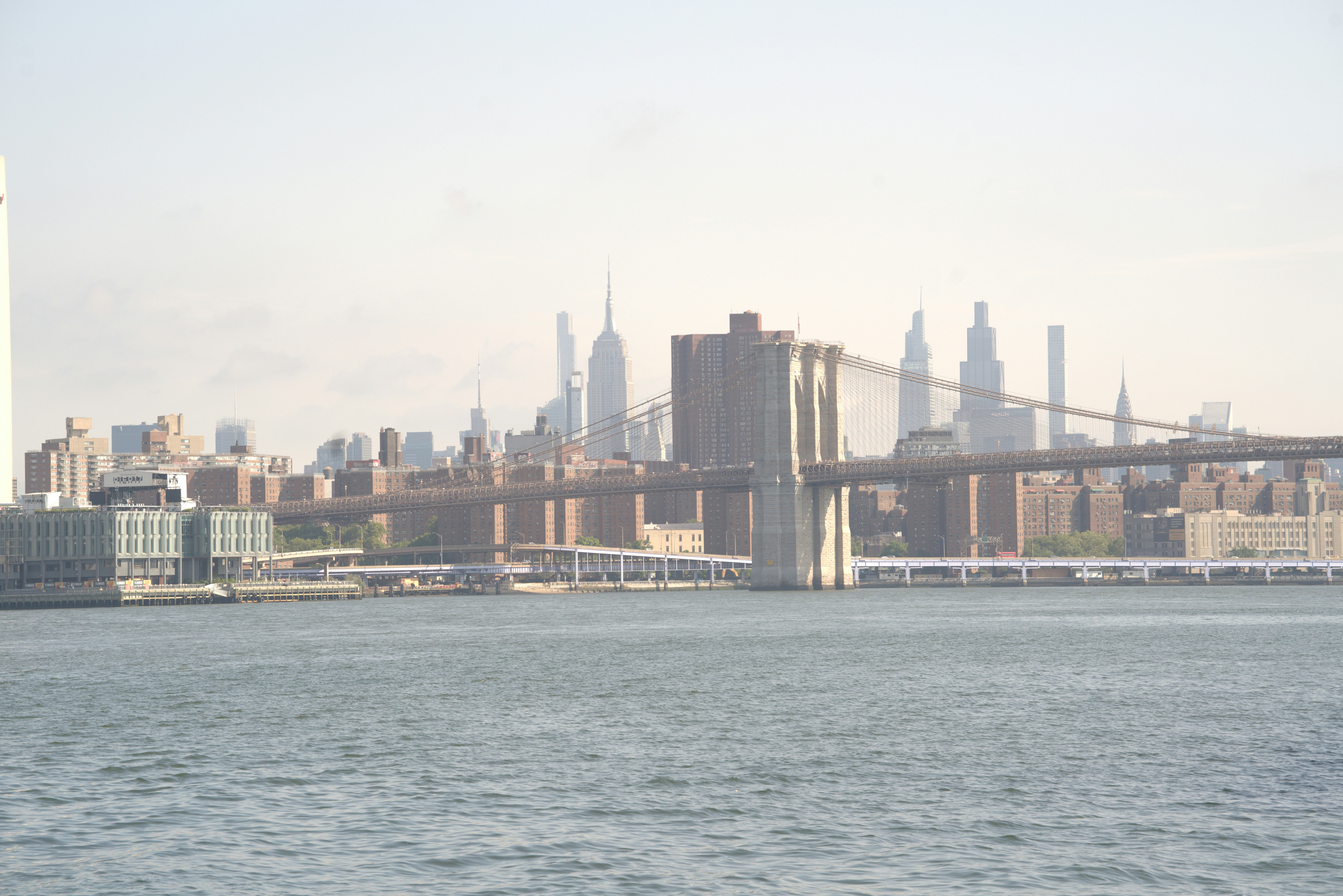 Brooklyn Bridge Vista: City Silhouettes Across the East River