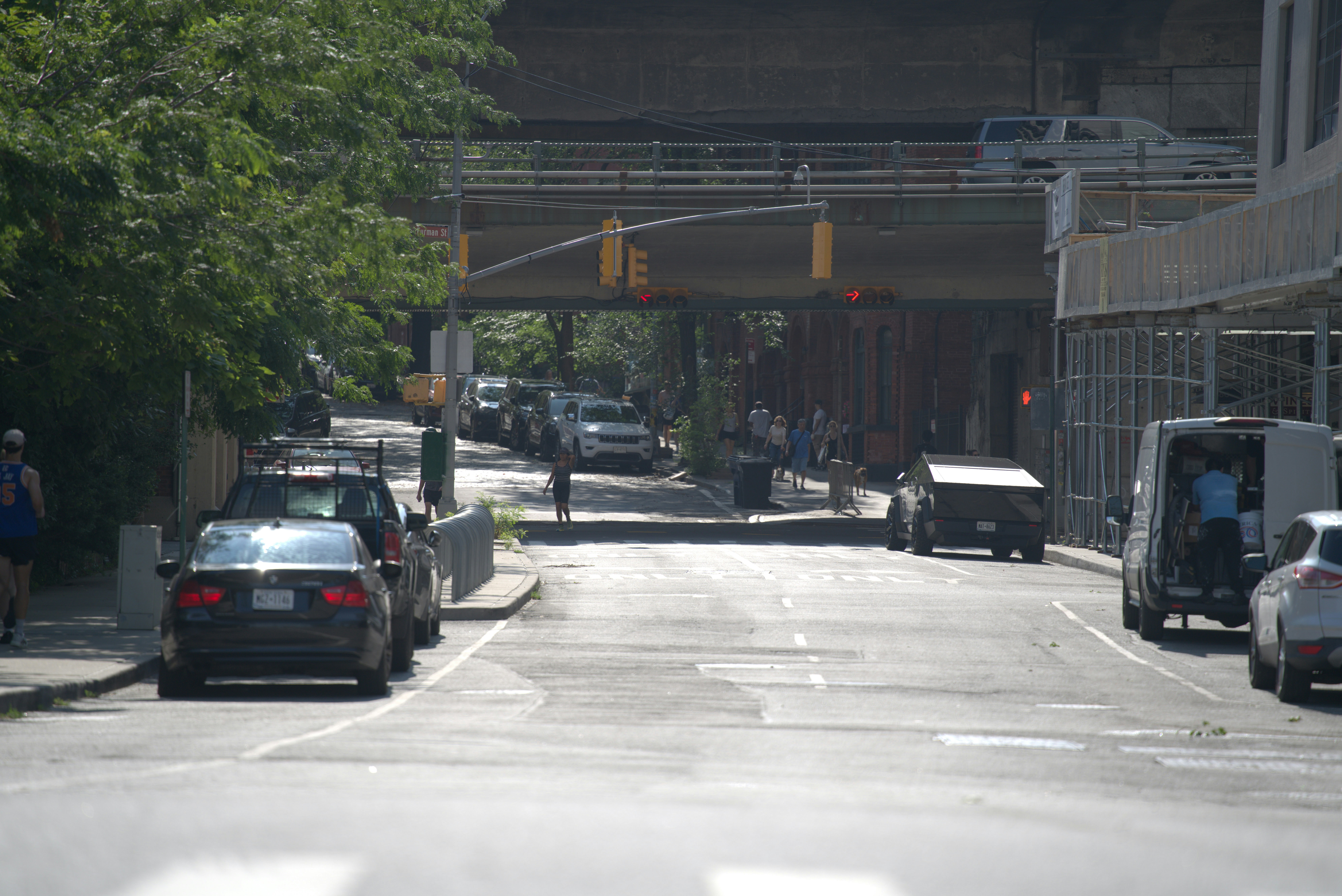 Midtown Street Scene Under a Rail Bridge