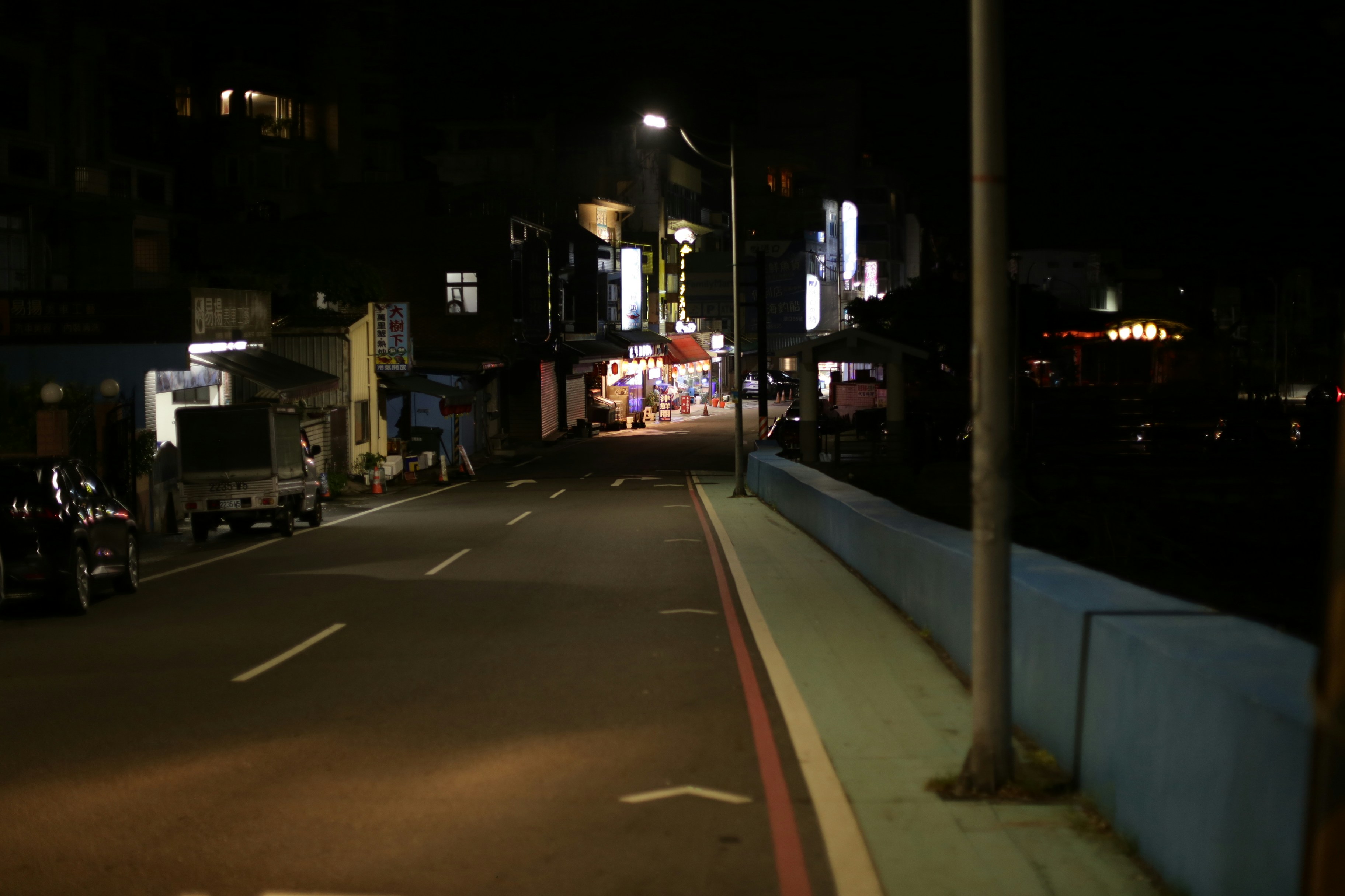 Night Street Crossing: A Quiet Corridor to Neon Engines