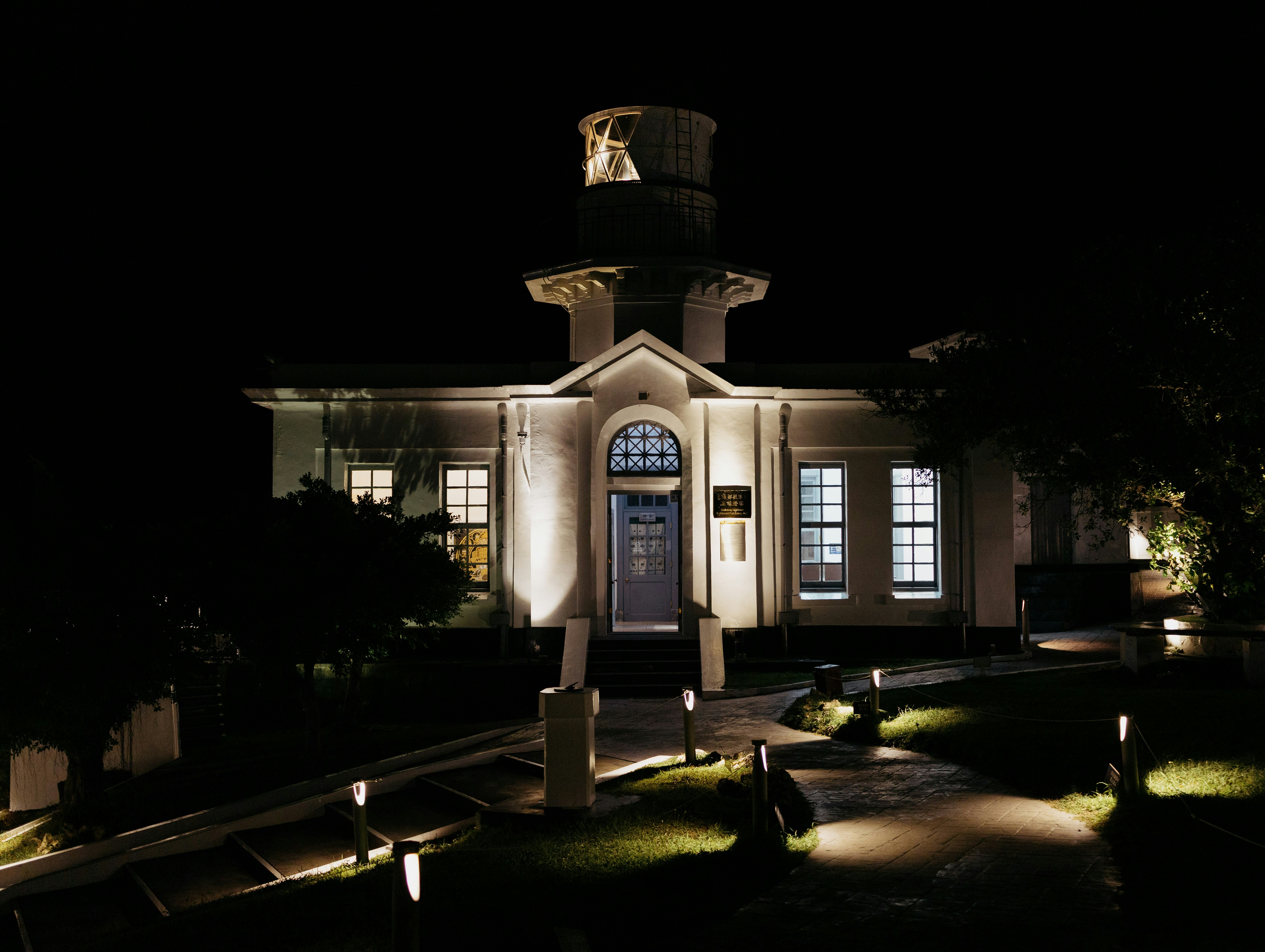 Nightfall at the Observatory: A Quietly Lit Facade