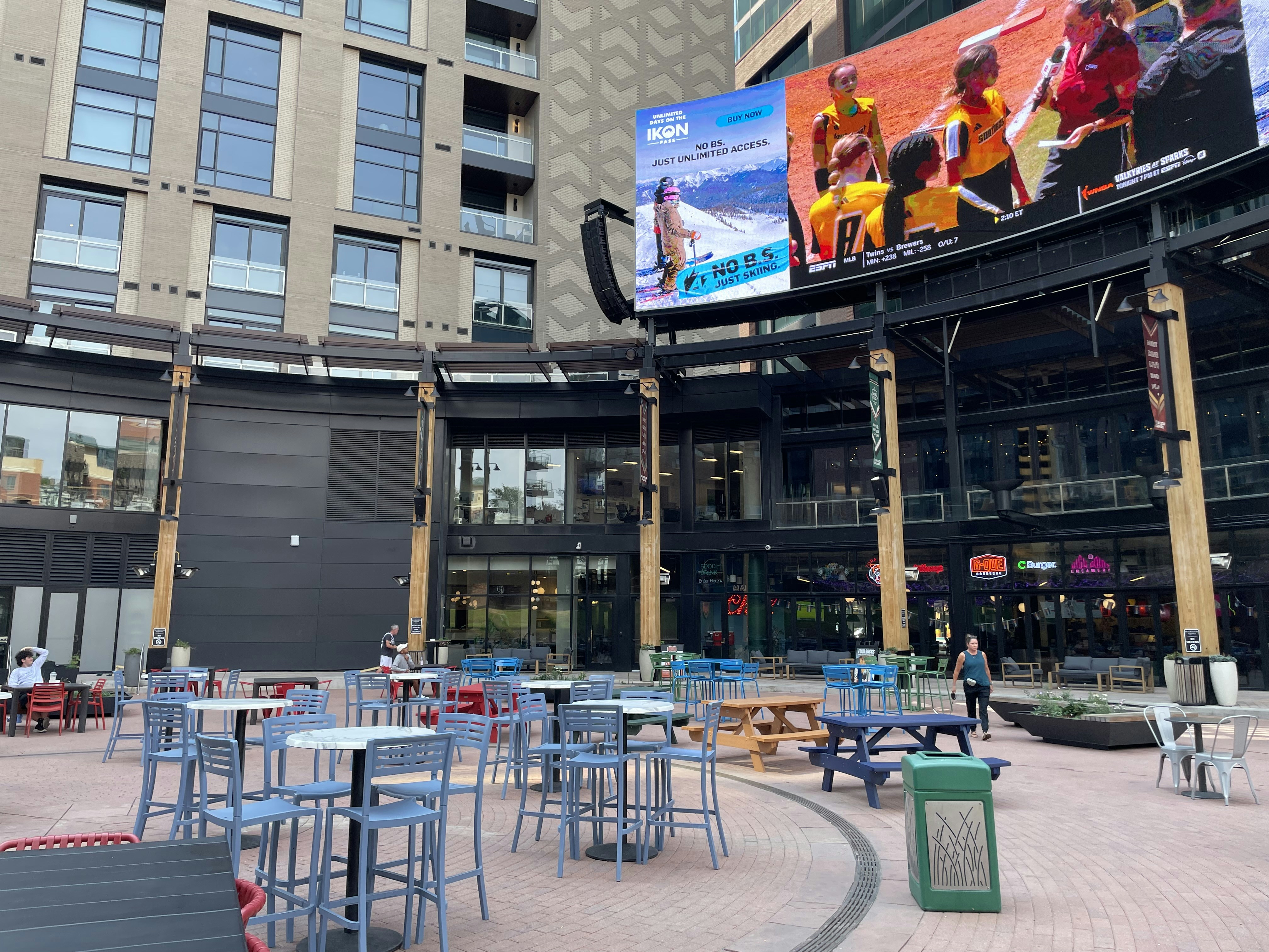 Urban Courtyard Arena: Glass Facades and Giant Screen