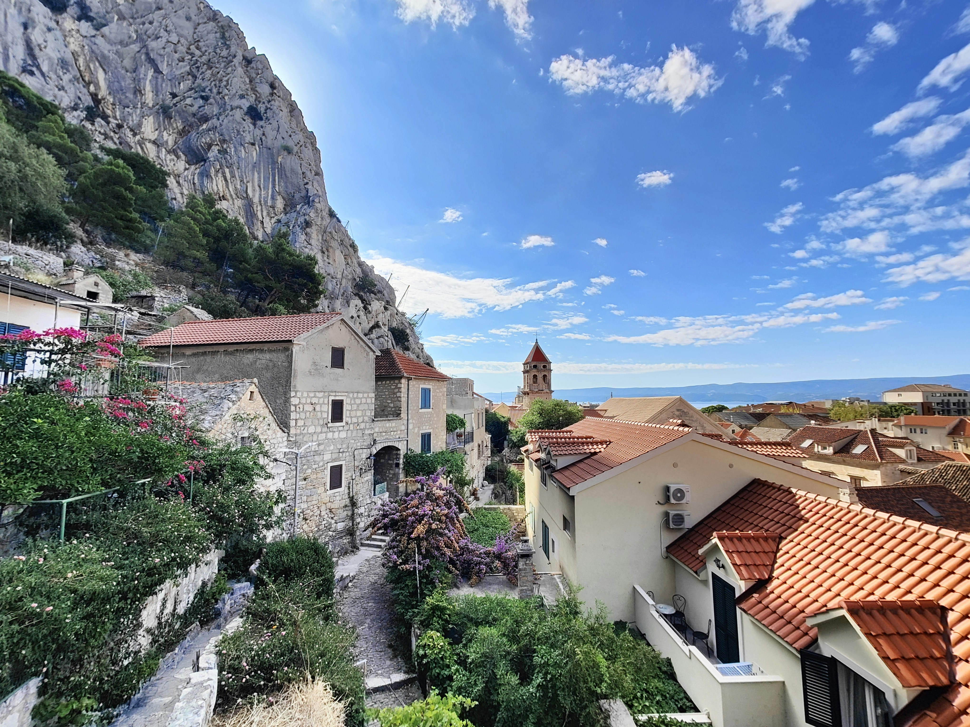 Coastal village tucked between cliff and sea