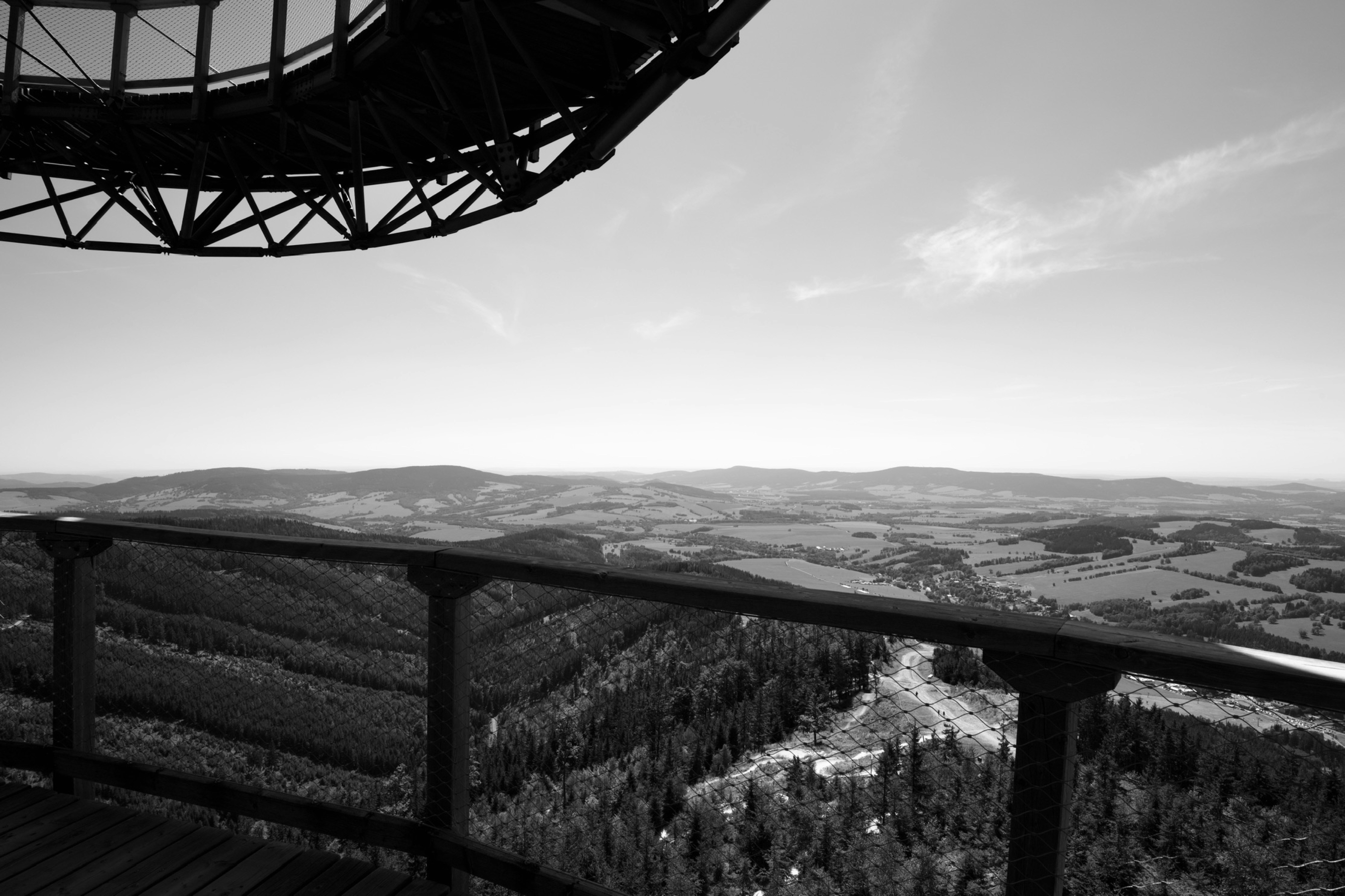 Overlooked Horizon: A Curved Structure Framing a Panoramic Valley