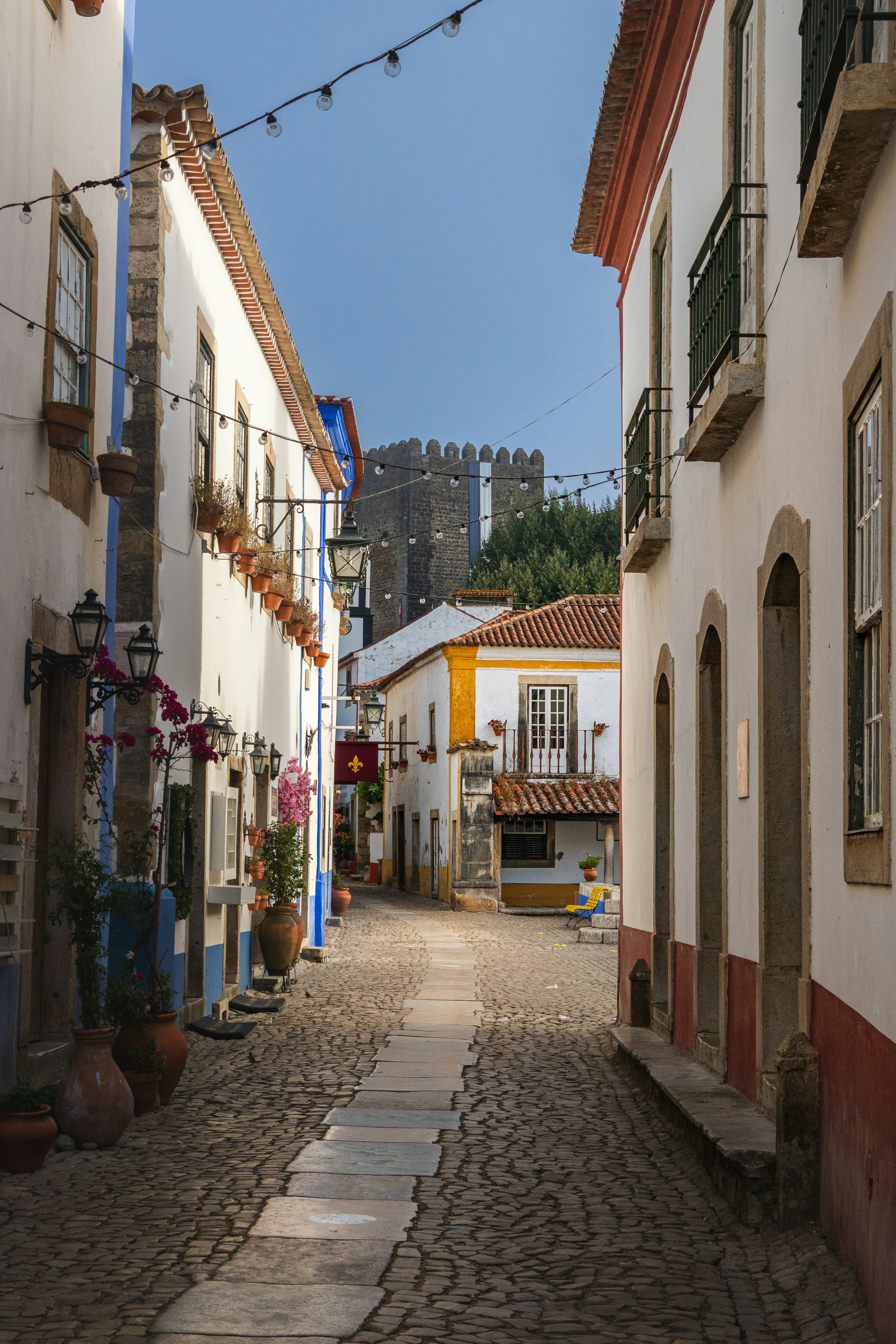 Cobbled Calle in a Sunlit Portuguese Town