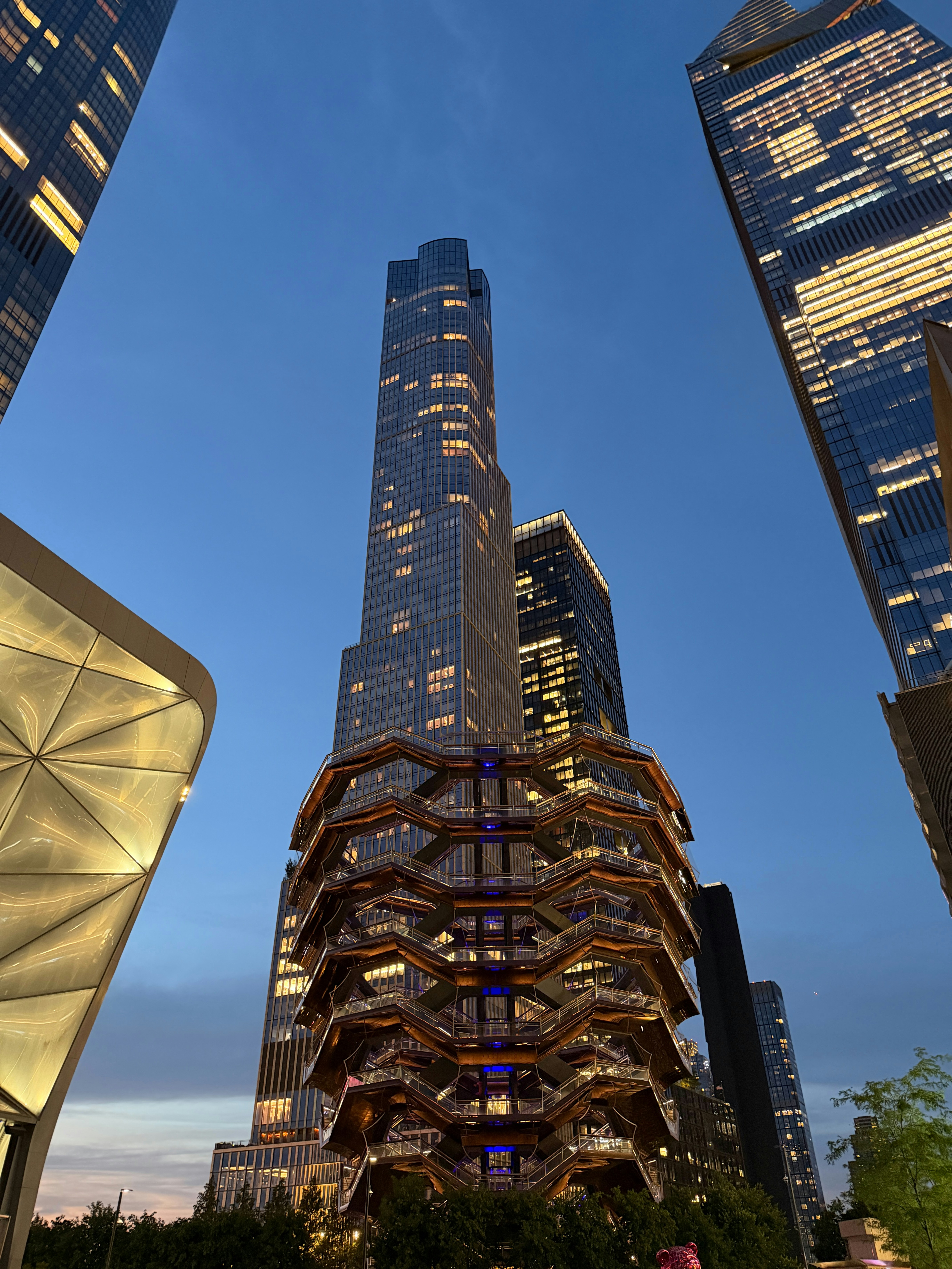 Iron Staircase Skyreach: A Towering Hover Above a Faceted Urban Landmark