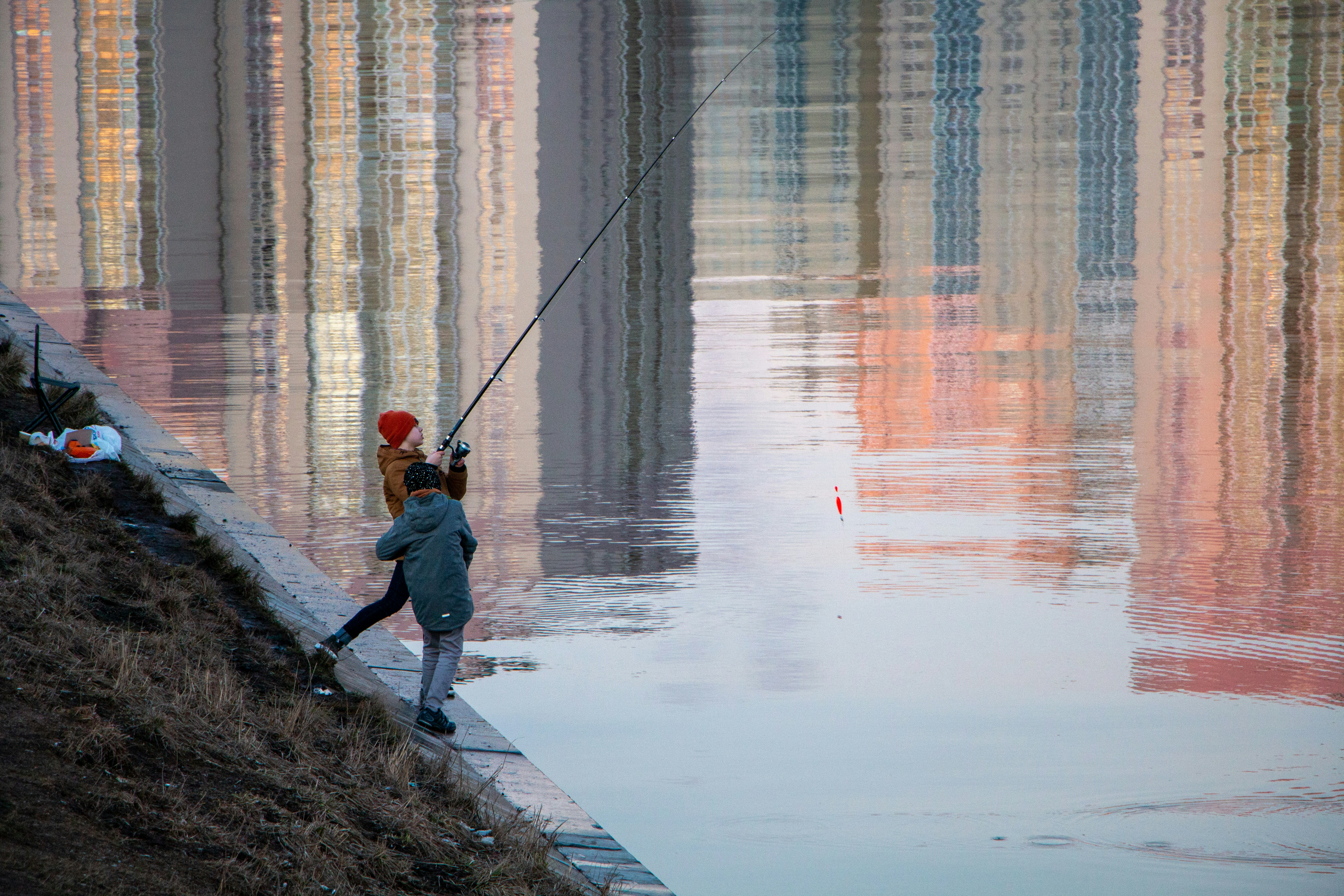 Casting Line, Reflections: A Child on the Riverbank